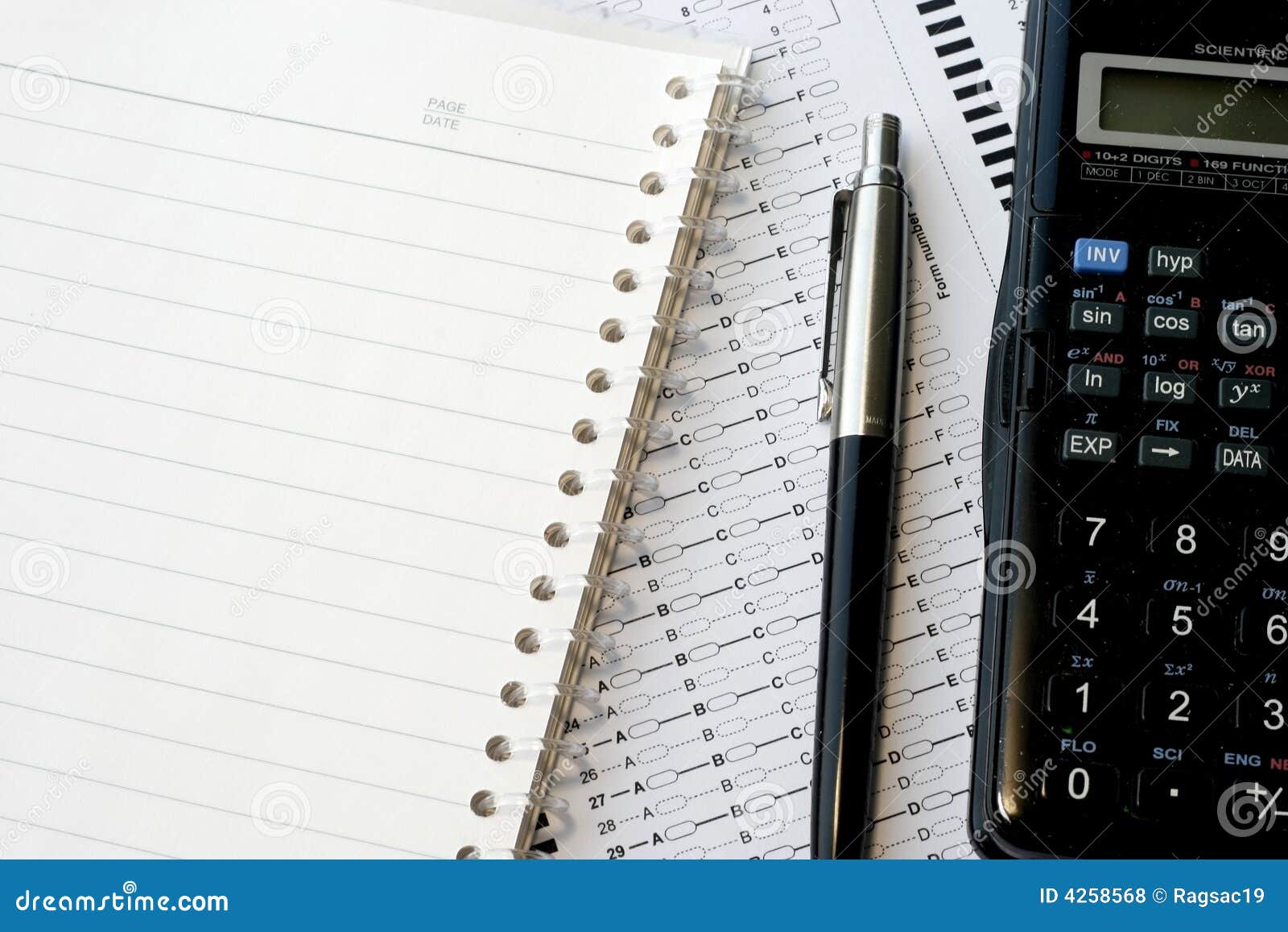 Spiral Notebook and Calculator Stock Photo - Image of attachment ...