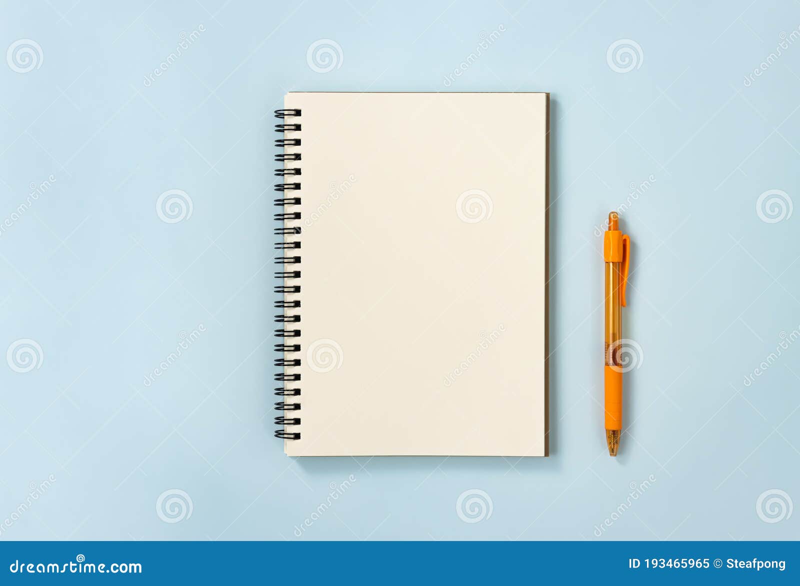 Spiral Notebook or Spring Notebook and Orange Pen on Pastel Minimalist ...