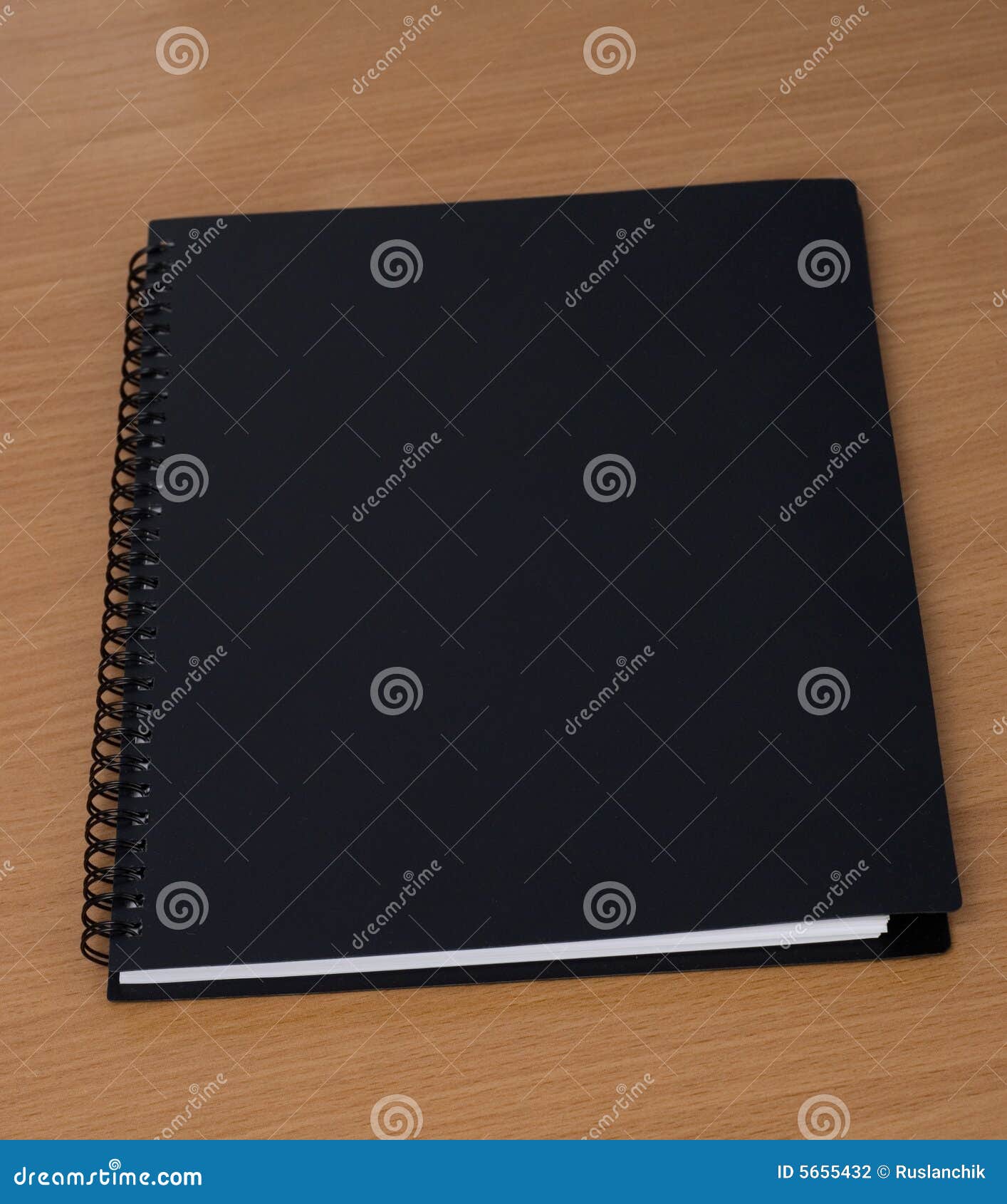 Spiral notebook on a table stock photo. Image of textbook - 5655432