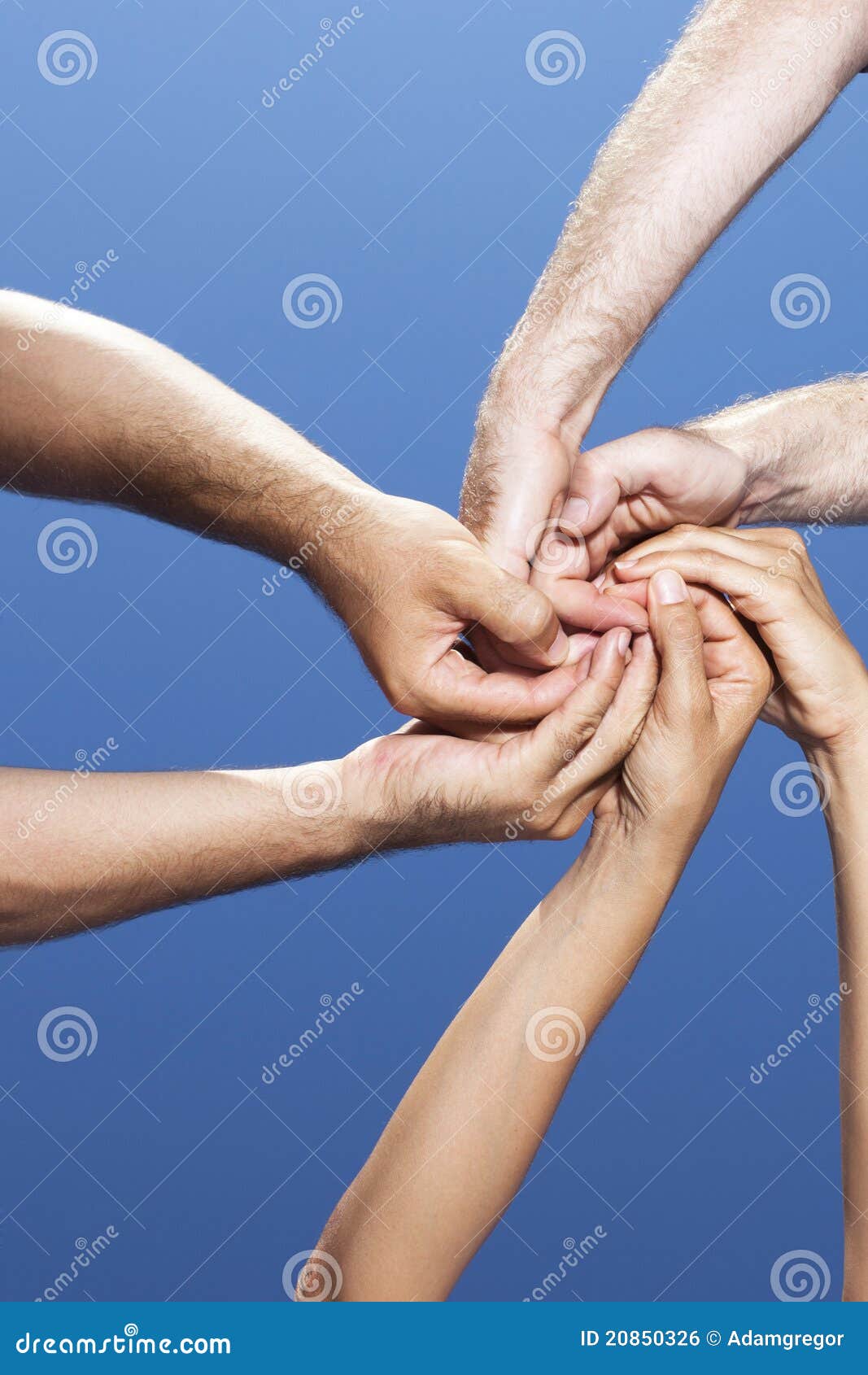 Spiral out of three hands stock photo. Image of trust - 20850326