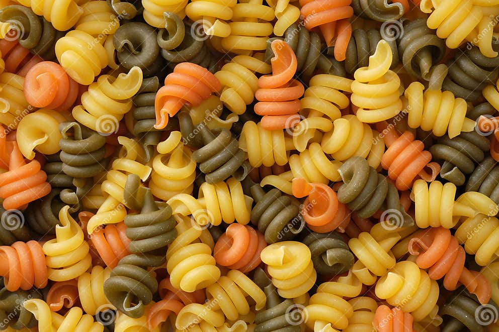 Spiral Pasta Background. Different Colored Pasta, Top View. Stock Photo ...