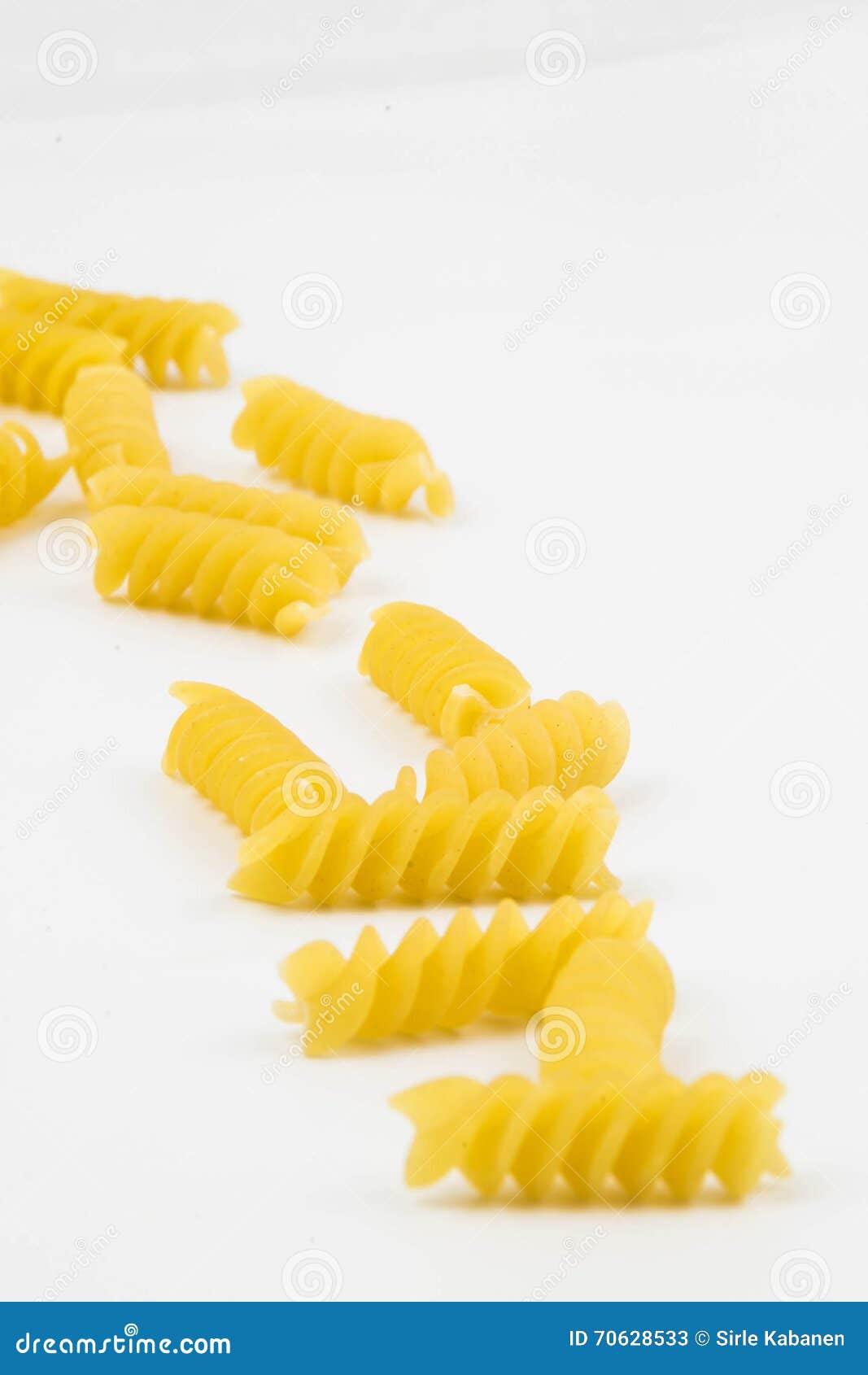 Spiral raw macaroni pasta stock image. Image of frame - 70628533