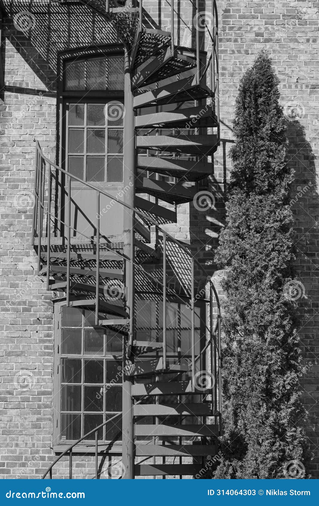 A Spiral Staircase on the Outside of a Building Stock Image - Image of ...