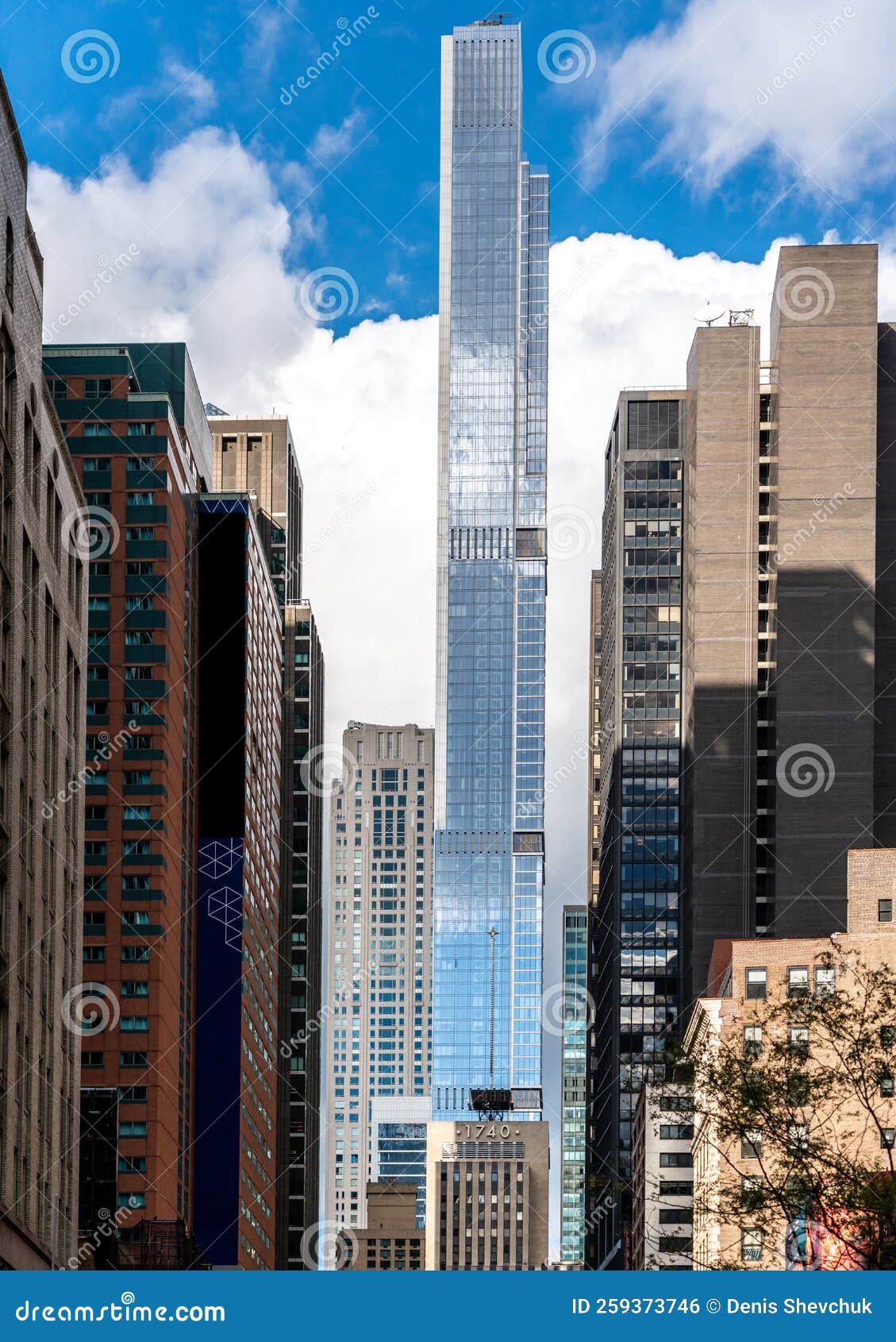 The Spire of a New Skyscraper among the Narrow Streets of New York ...