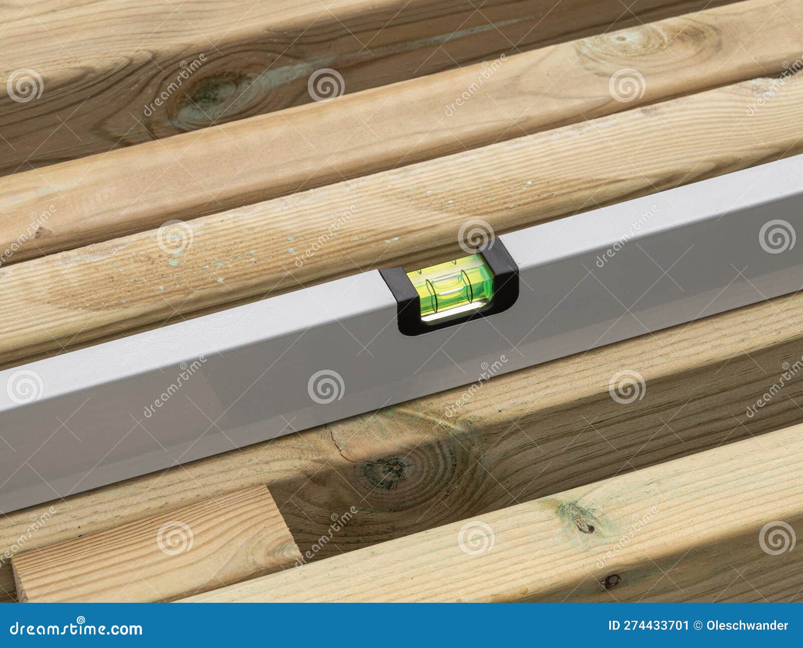 Spirit Level or Construction Water Level Checking the Level of a Plank ...