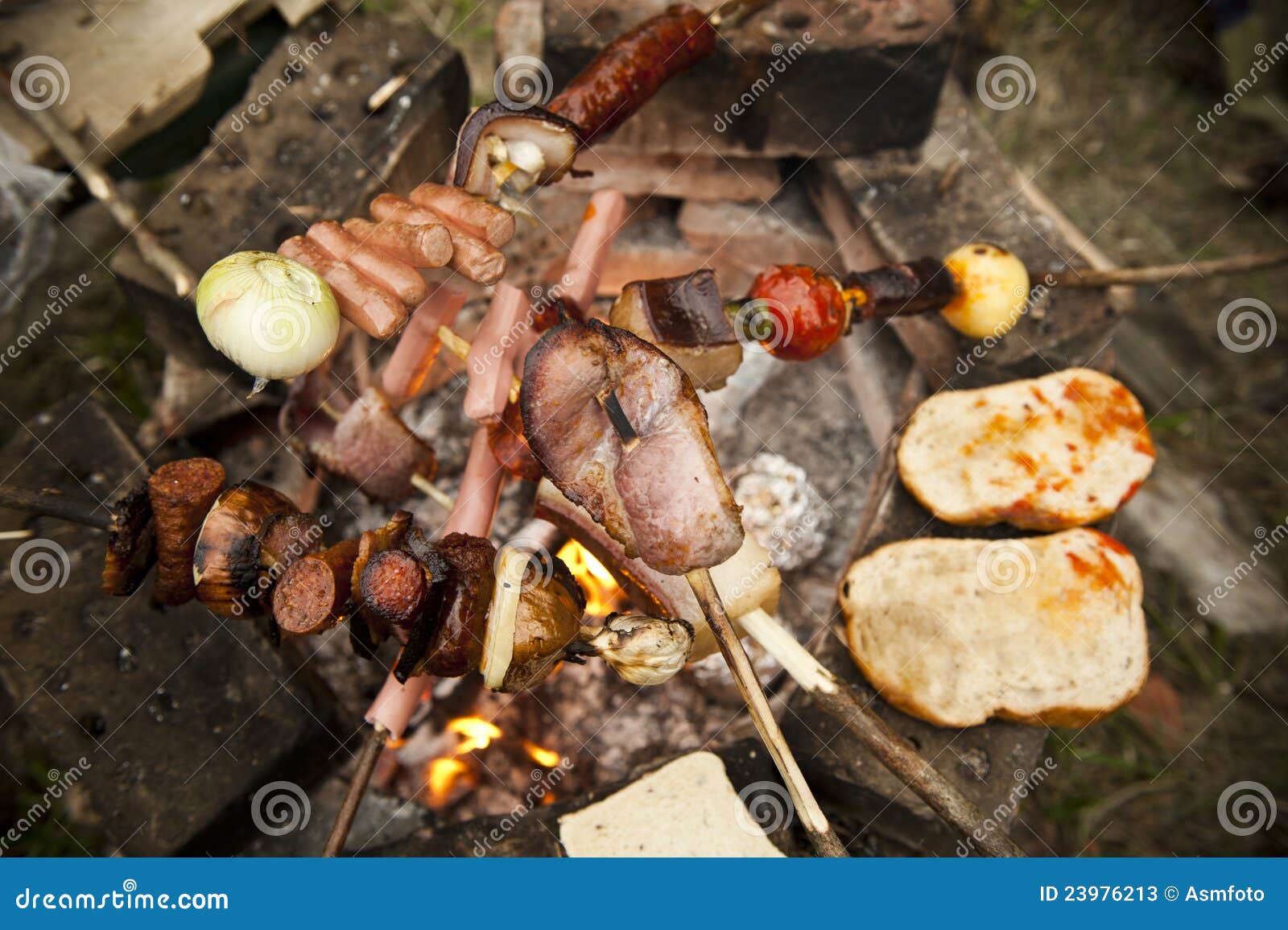Spit cooking on the grill. stock image. Image of grill - 23976213