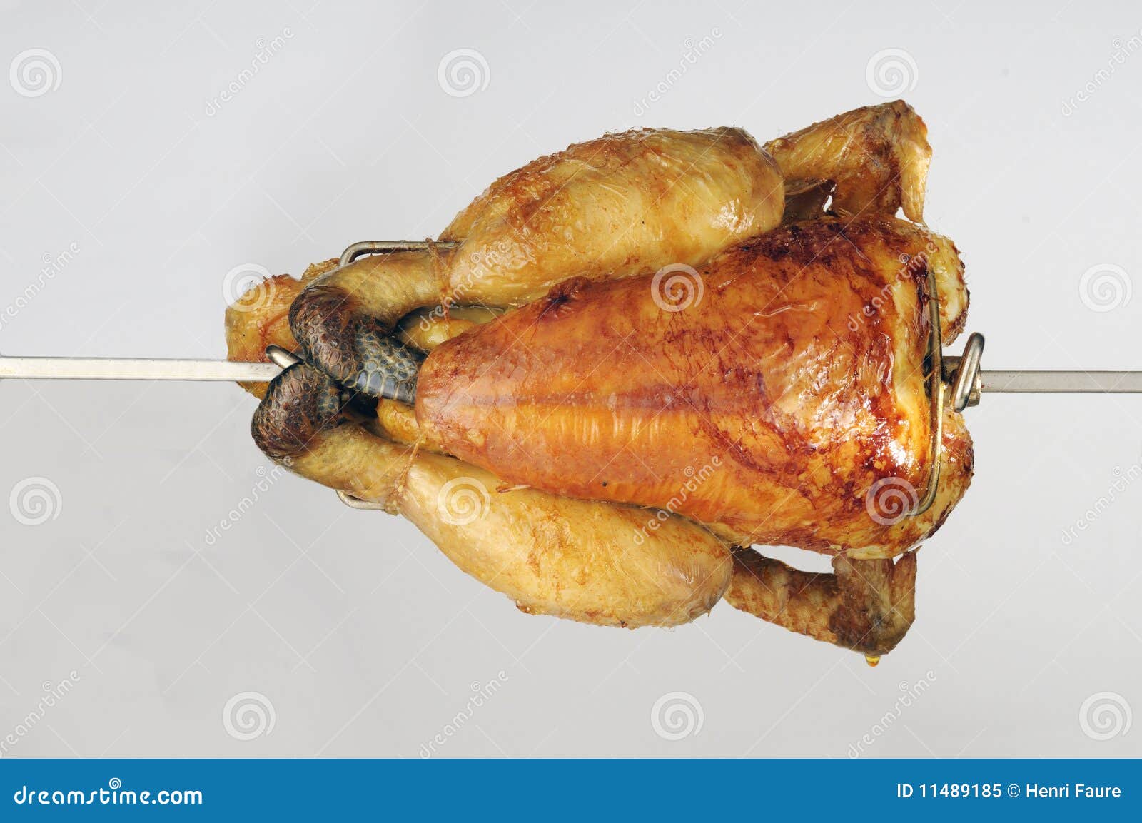 Spit roasted chicken stock image. Image of chicken, hungry - 11489185