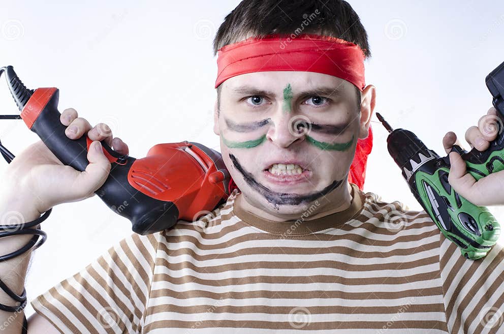 Spiteful Man in War Paint with Two Drills Stock Image - Image of ...