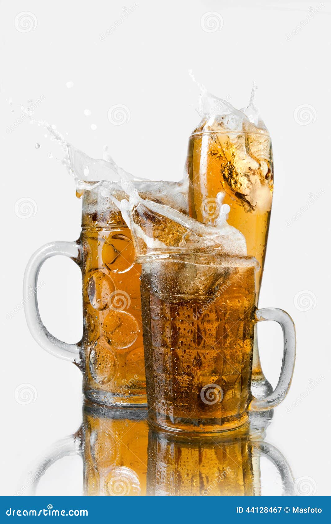 Splash beer in glasses stock image. Image of delicious - 44128467