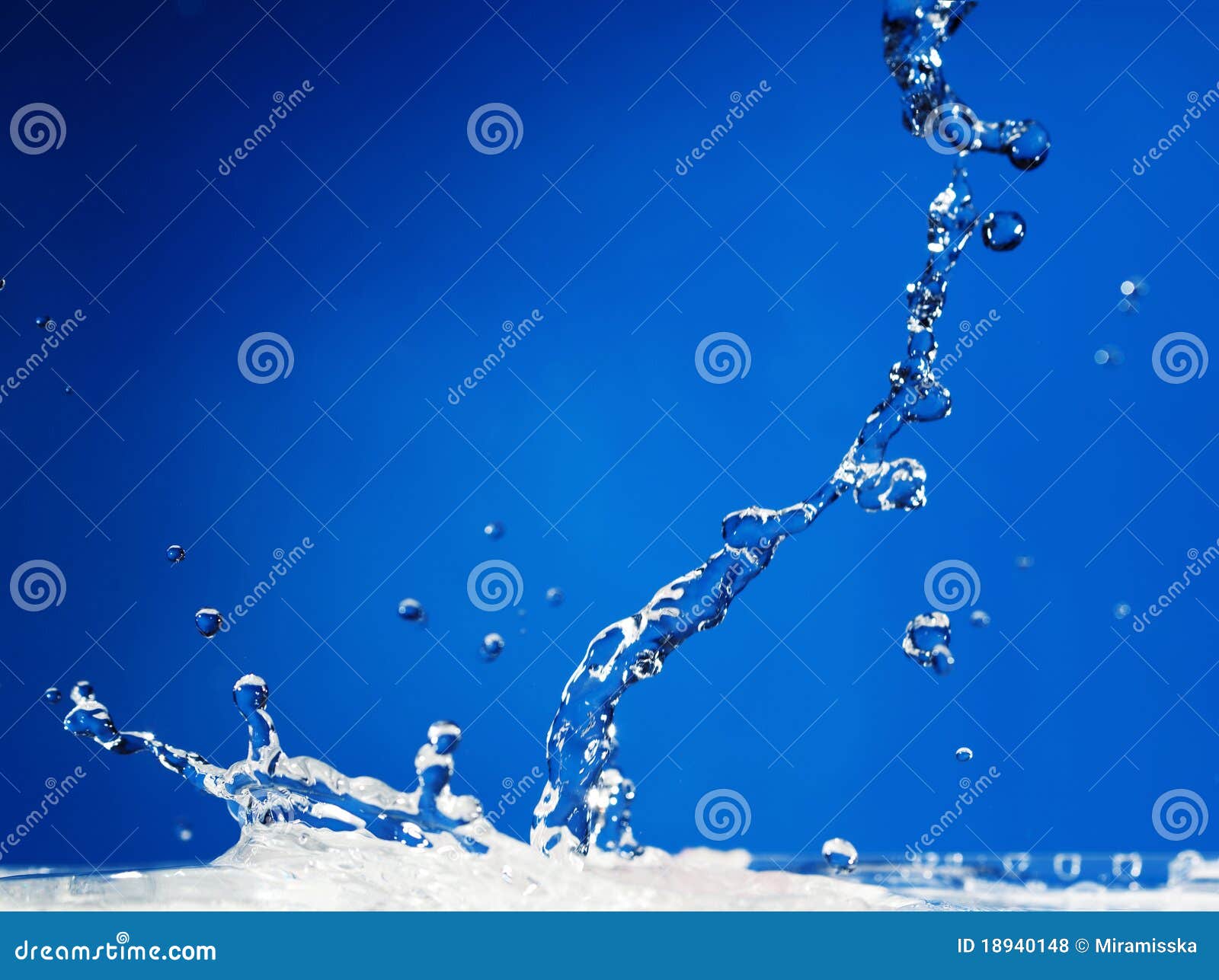 Splash on a Blue Background Stock Photo - Image of drip, fresh: 18940148