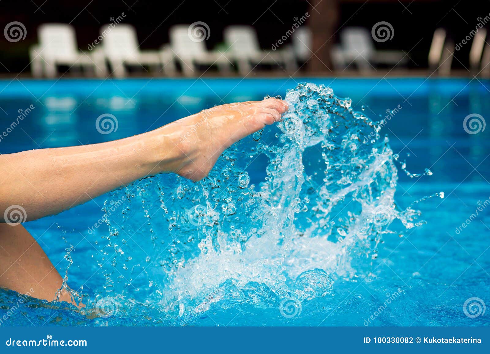 Splash in the pool stock photo. Image of foot, blue - 100330082