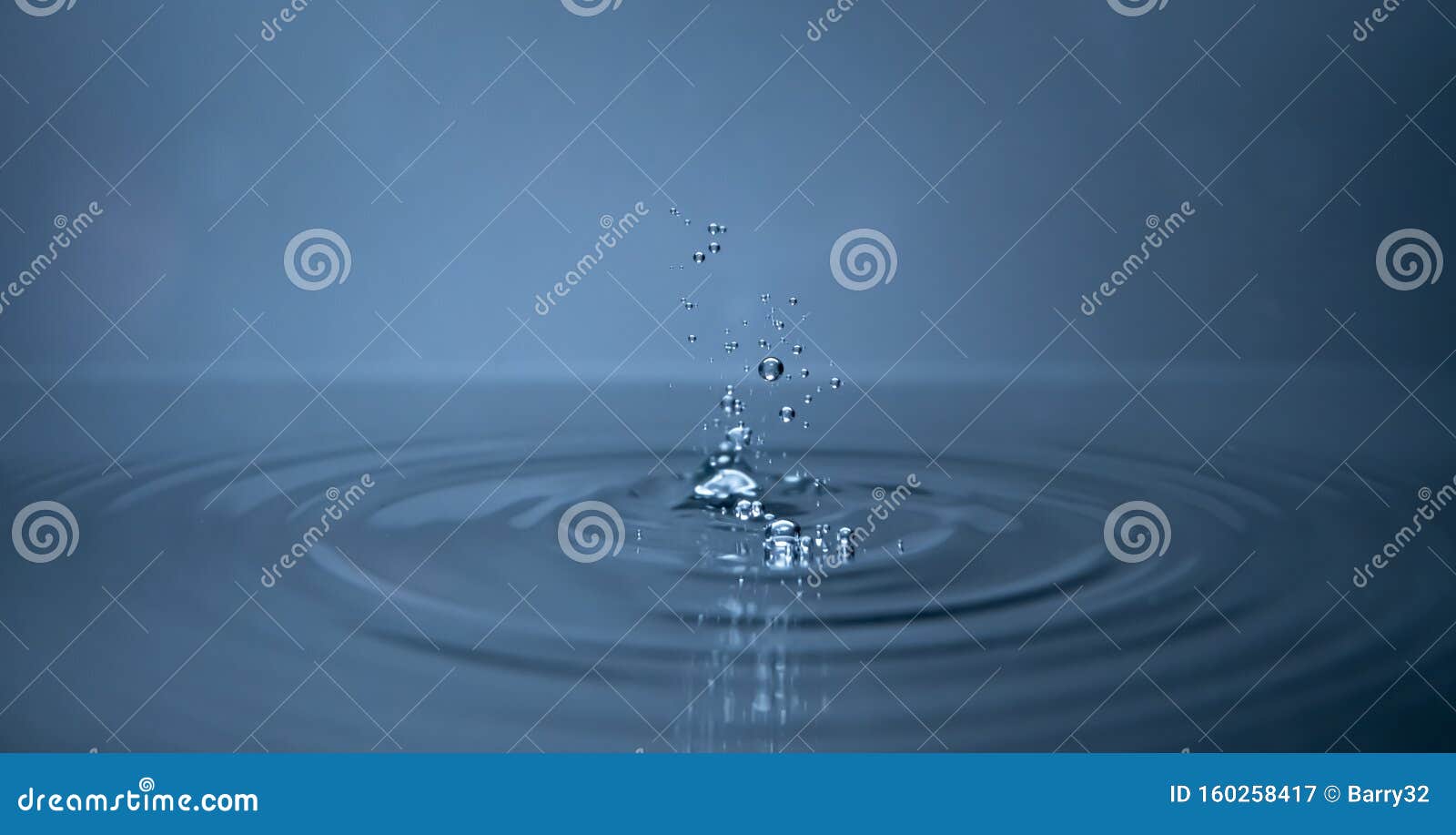 Splash and Bubbles in Cold Fresh Water with Ripples in Concentric ...