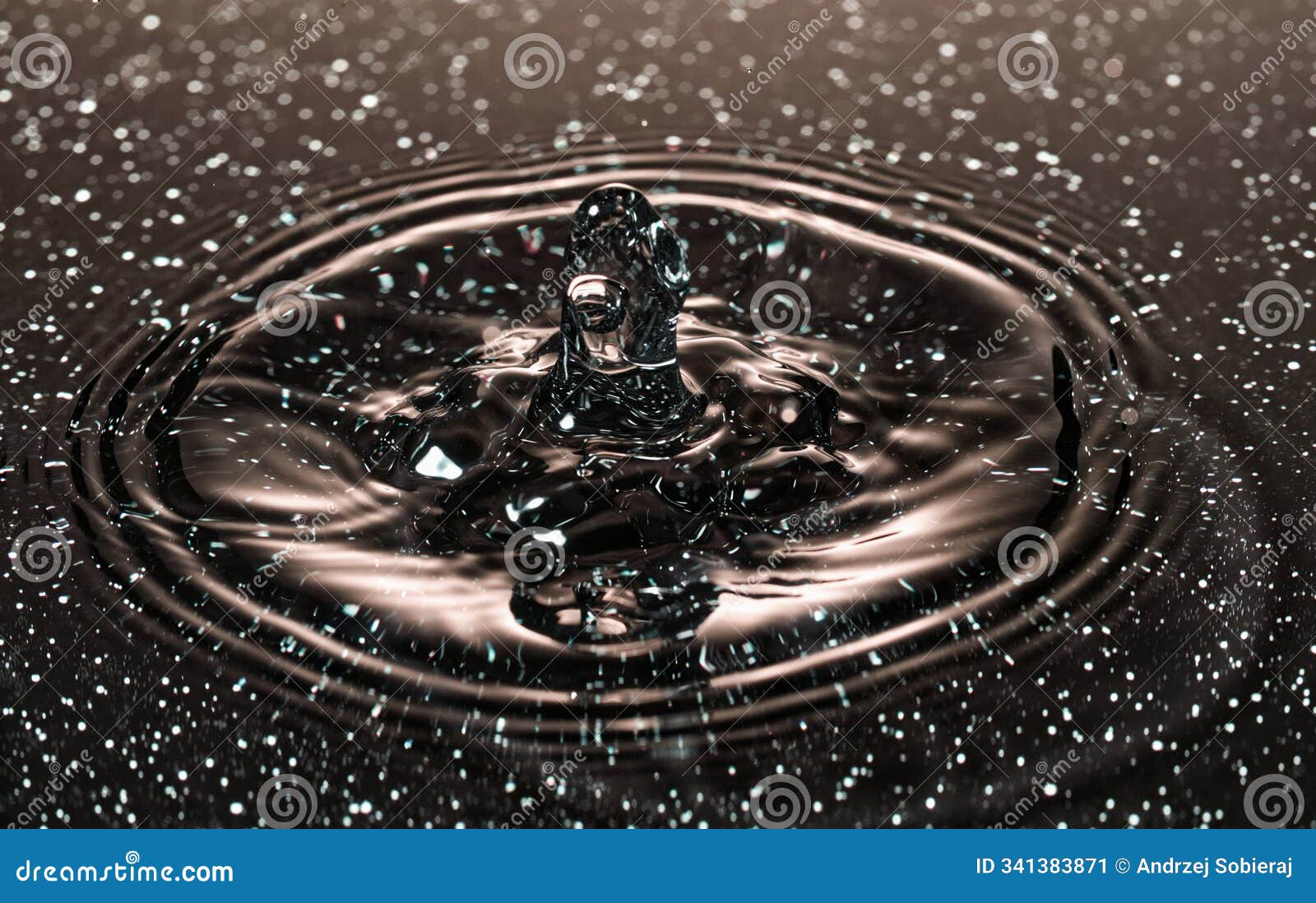 Splash - a Drop Falling Onto the Water Surface in Macro Shot Stock ...