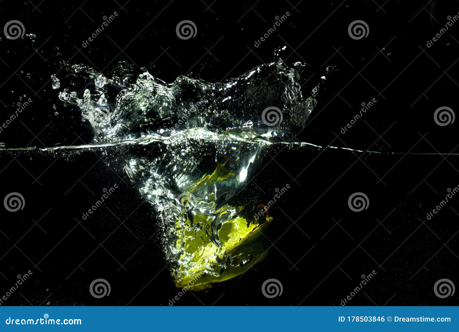 Splash of Fresh Starfruit Water on a Black Background Stock Photo ...