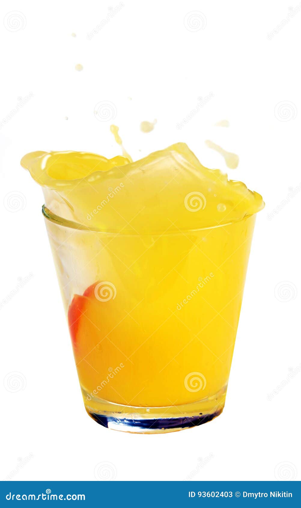 Splash in Glass of Juice with Falling Slice of Orange Stock Image ...