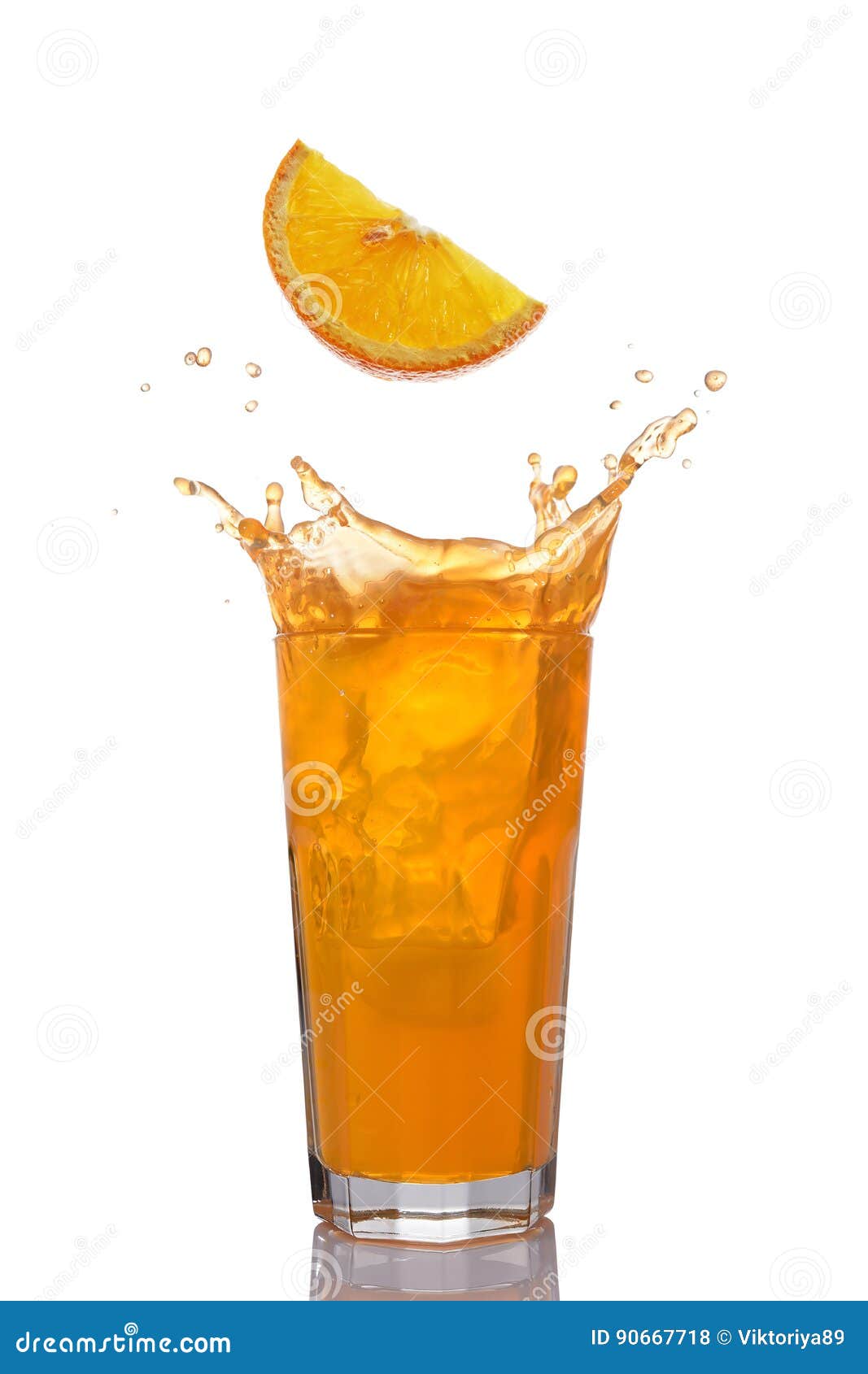 Splash in Glass of Juice with Falling Slice of Orange Stock Photo ...