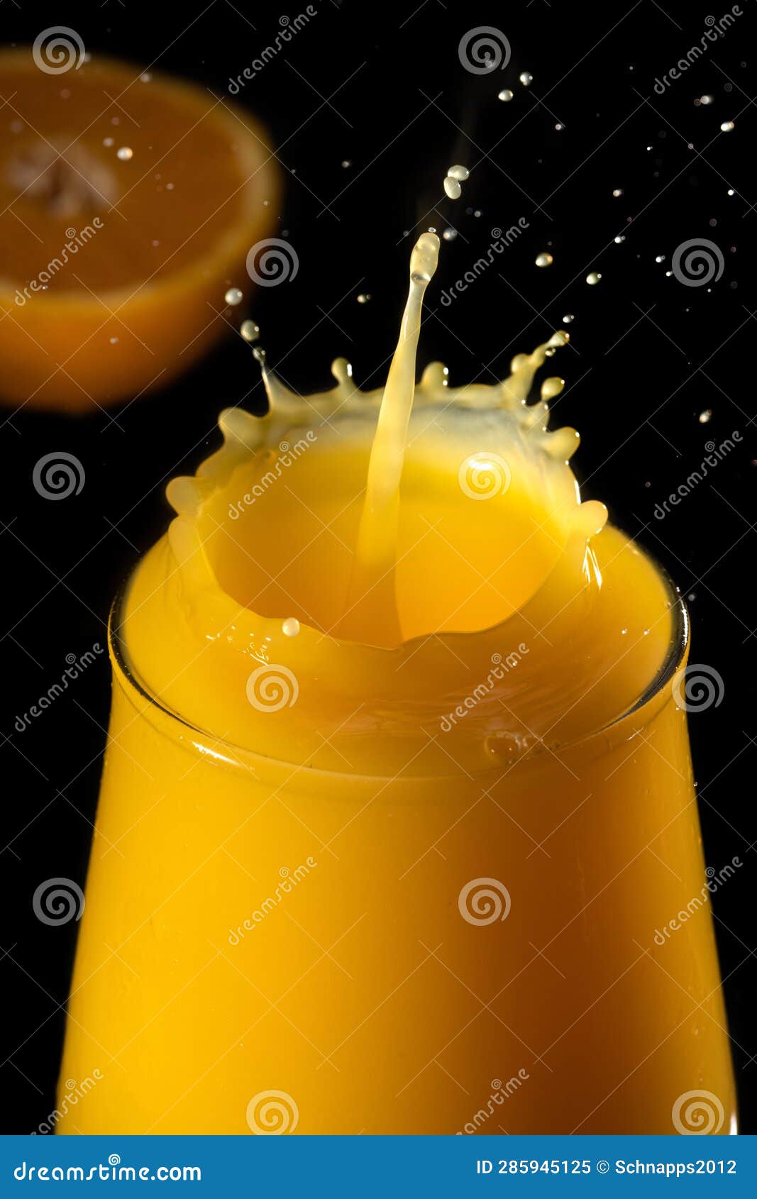 Splash in a Glass of Orange Juice Stock Image - Image of splashing ...