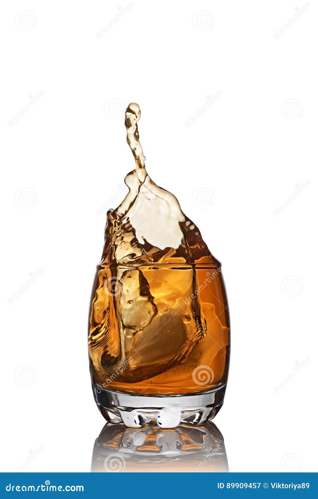Splash in Glass of Scotch Whiskey with Ice Cube Stock Image - Image of ...