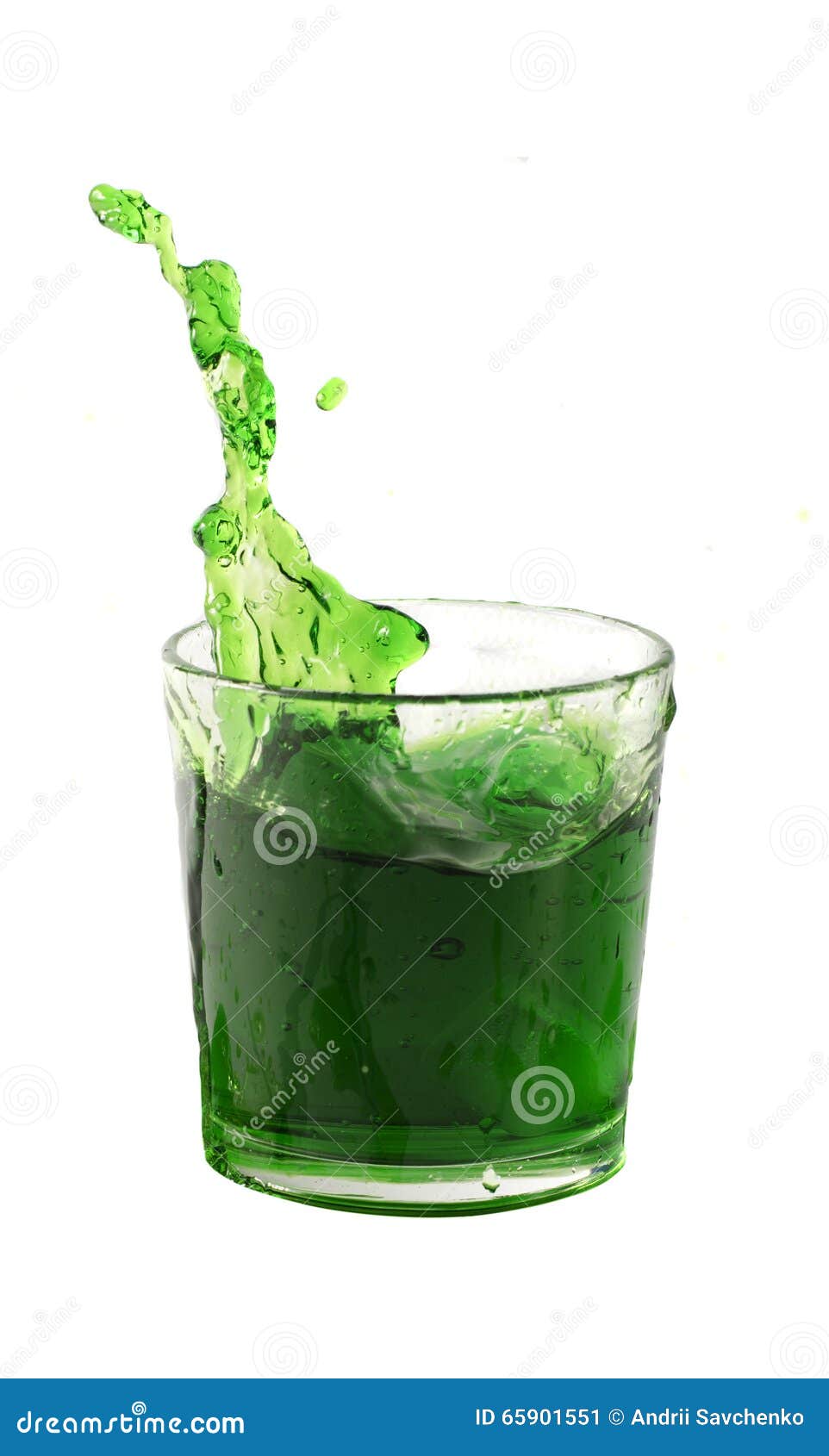 Splash from Ice Cube in a Glass of Green Water or Drink Stock Image ...