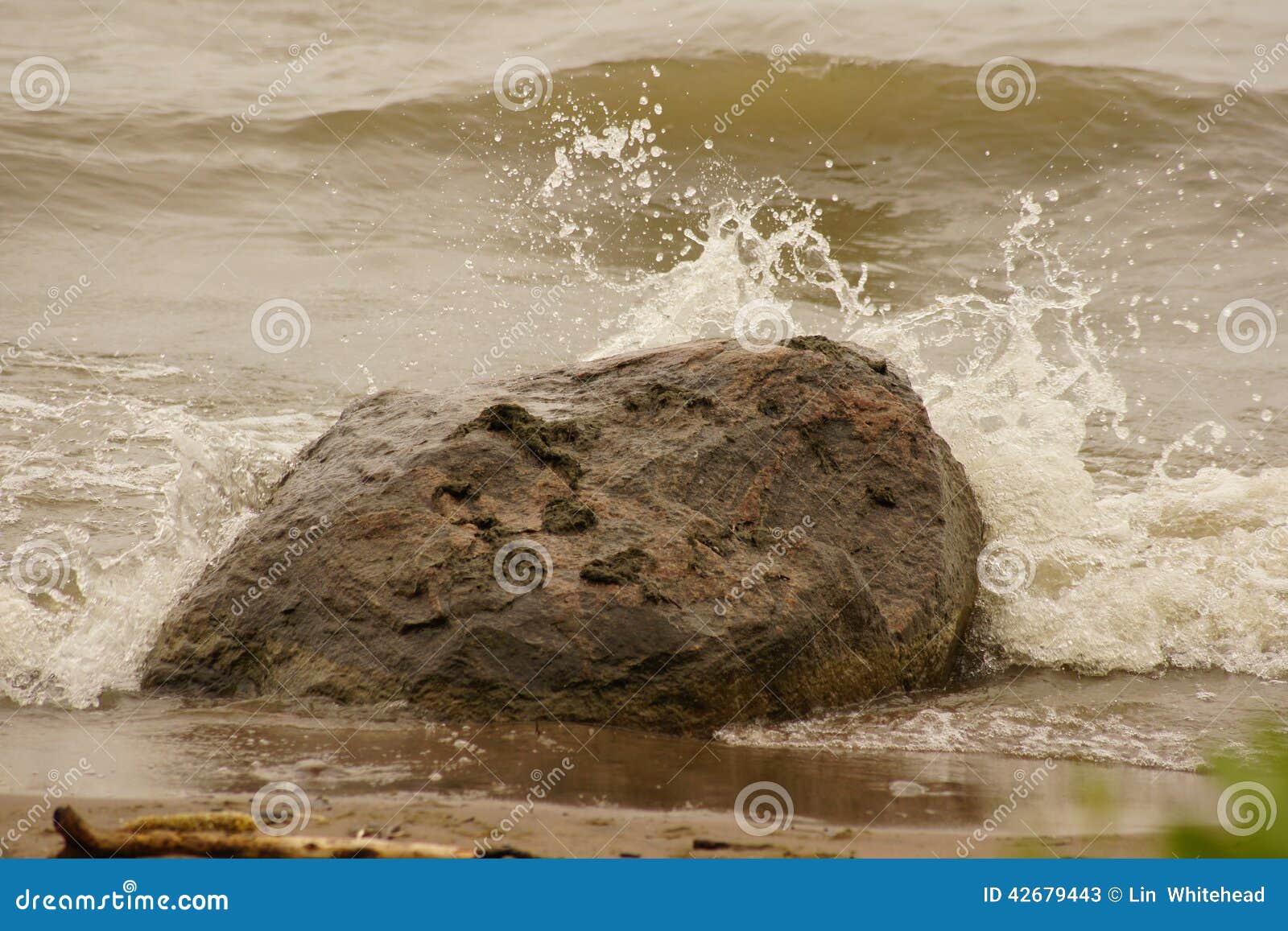 Splash on Large Rock stock image. Image of sand, splash - 42679443