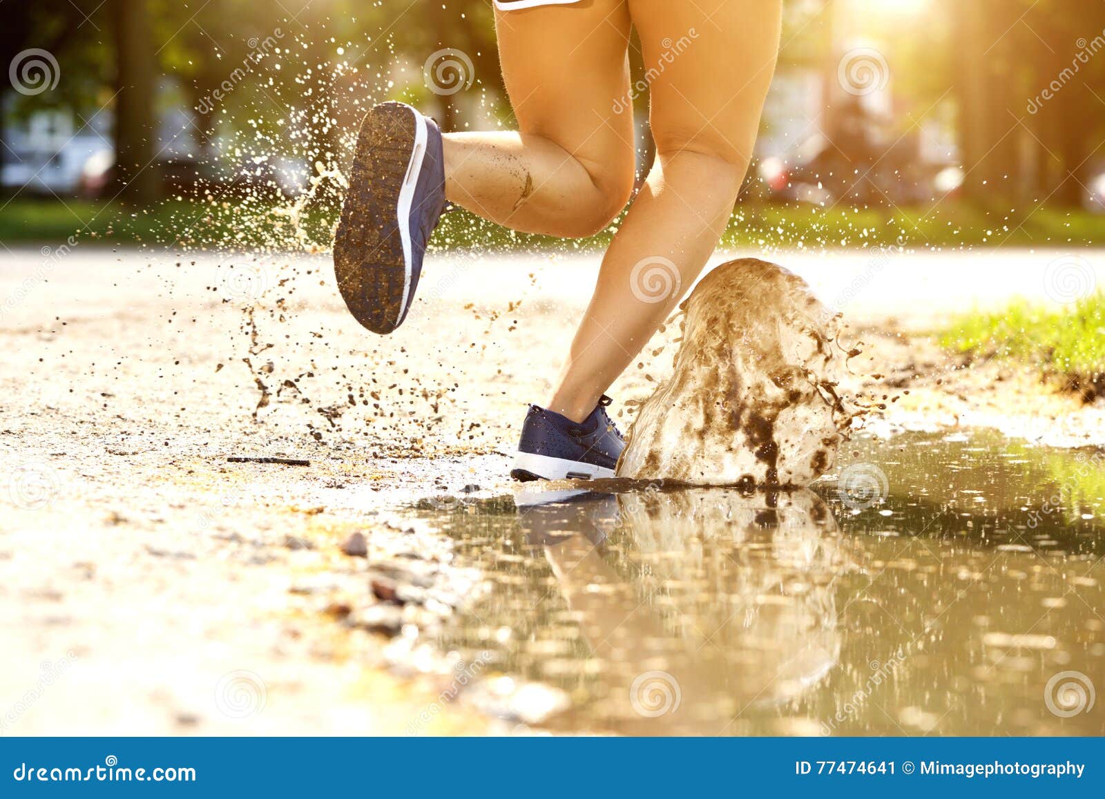 Splash in Mud Puddle by Runner Stock Image - Image of fitness, foot ...
