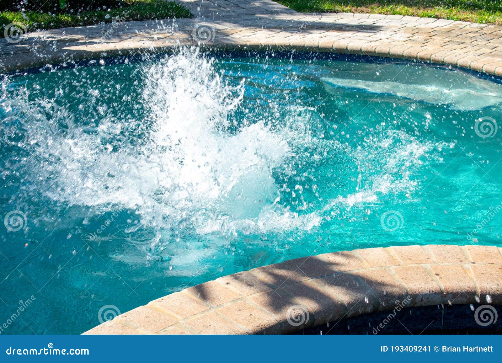 A Splash In A Pool Caused By A Boy Jumping Into The Water Royalty-Free ...