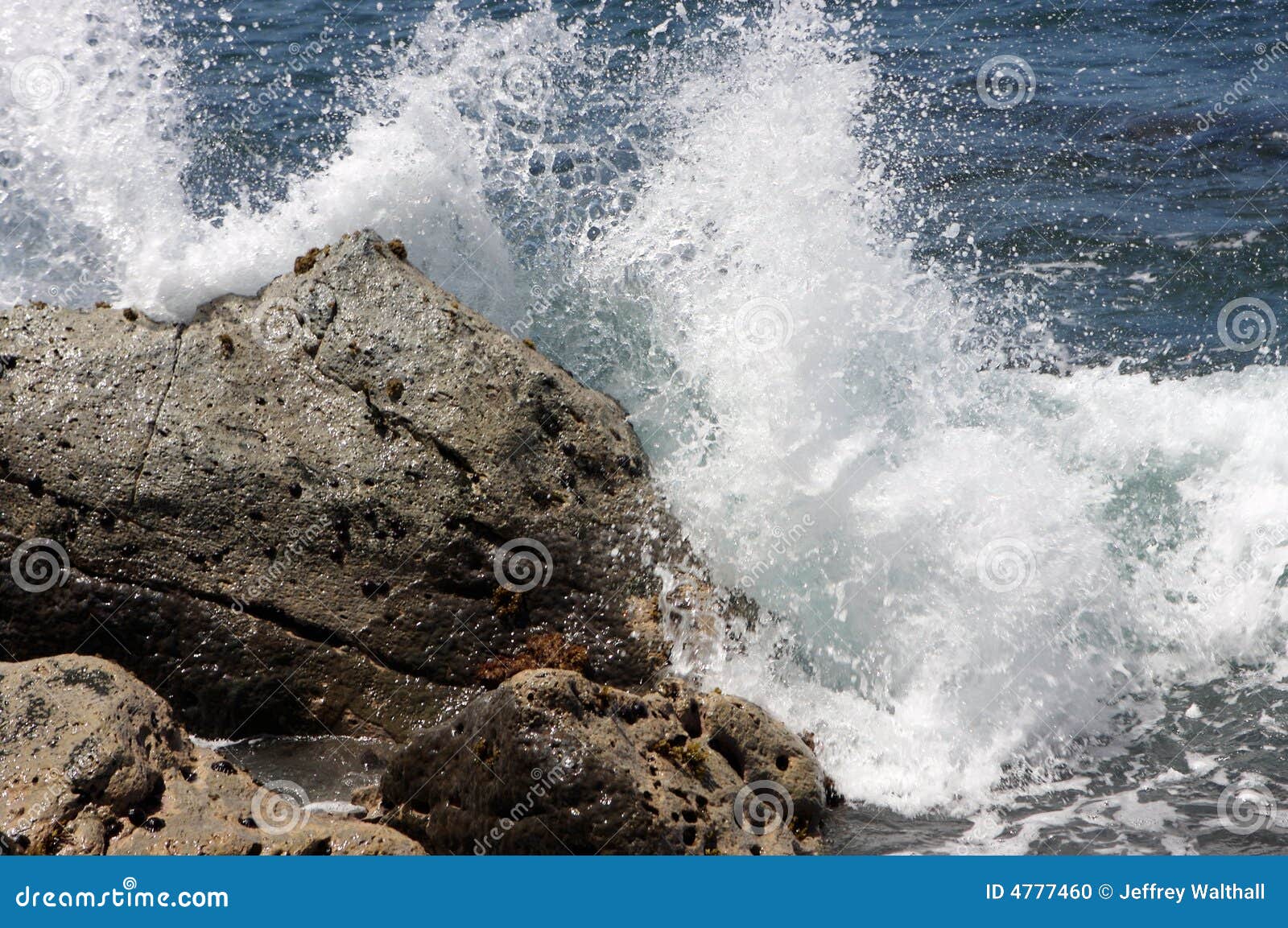 Splash on rocks stock photo. Image of shorebreak, splash - 4777460