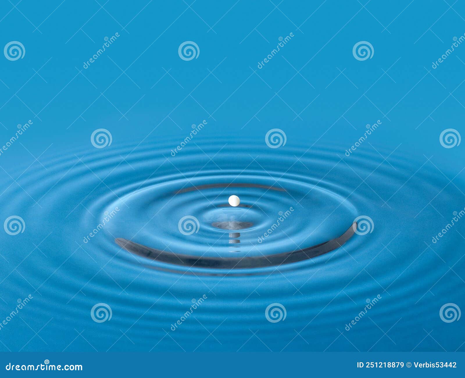 Splash of a White Round Drop in Blue Water with Circles Stock ...