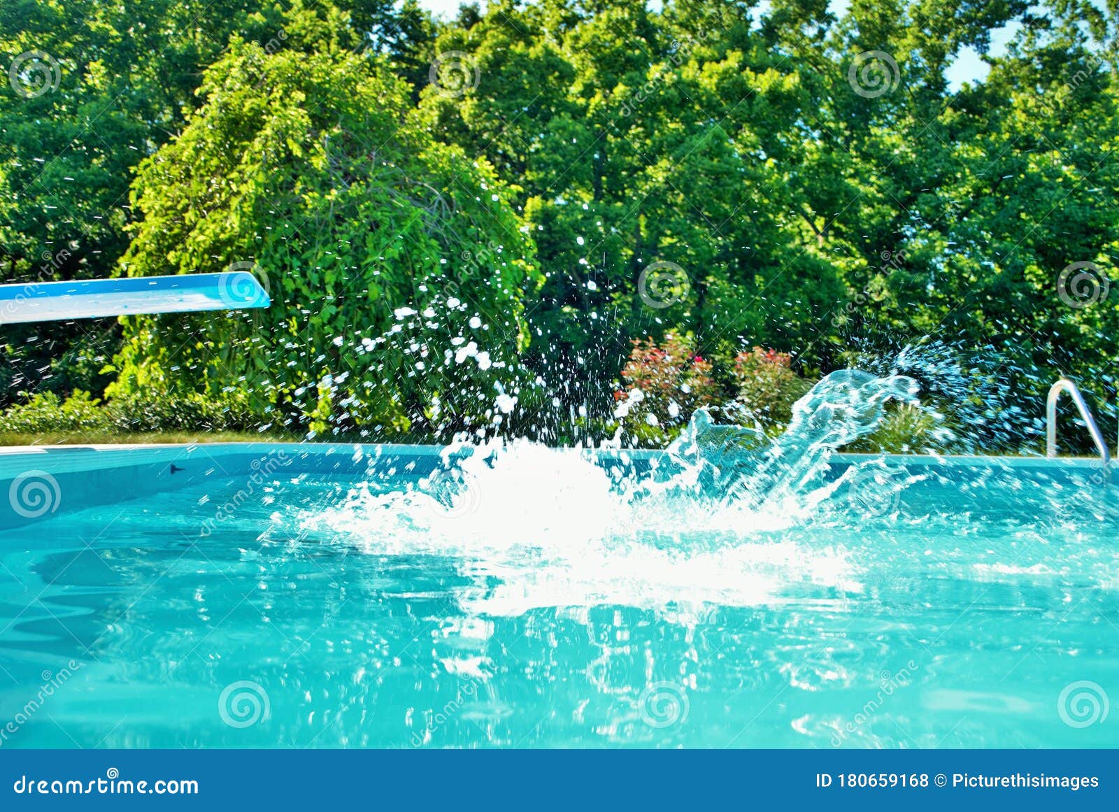 Splash after Someone Jumped into a Swimming Pool from the Diving Board ... Splash after Someone Jumped into a Swimming Pool from the Diving Board ...