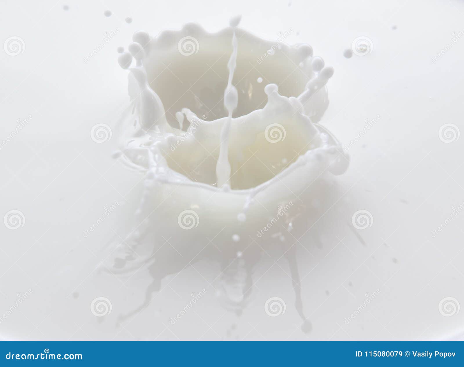 Splash and Splashes from Falling Milk Like a Crown Stock Image - Image ...