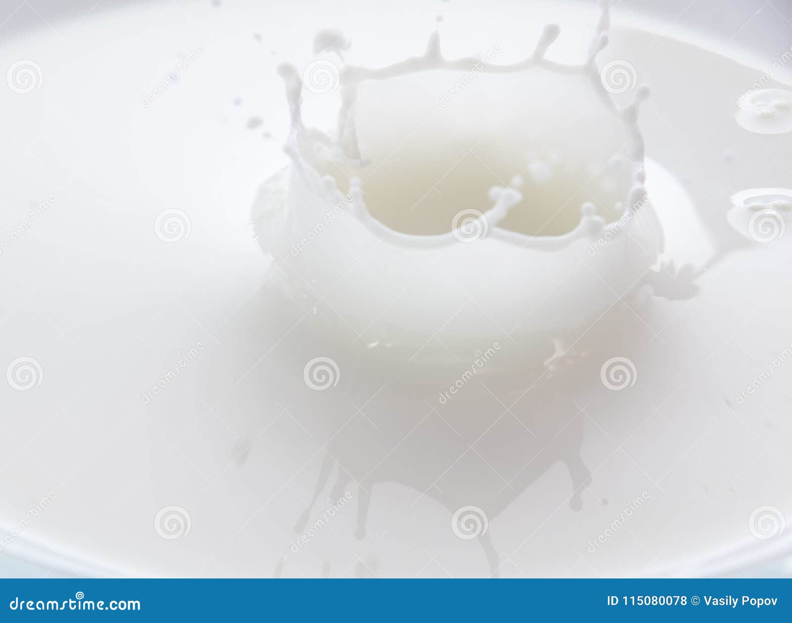 Splash and Splashes from Falling Milk Like a Crown Stock Photo - Image ...