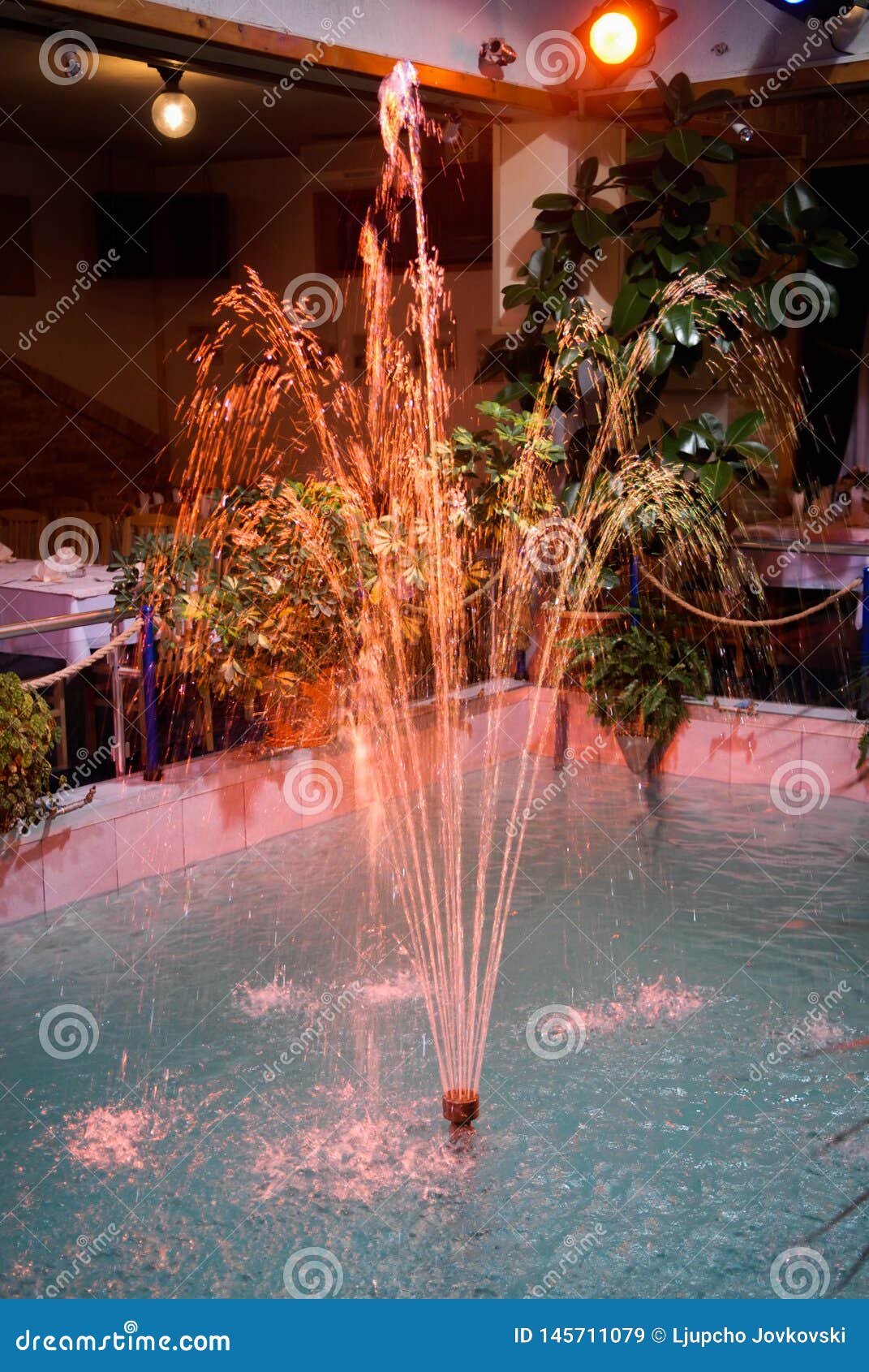 Splash of Water Drops in the Fountain in Restaurant Stock Image - Image ...