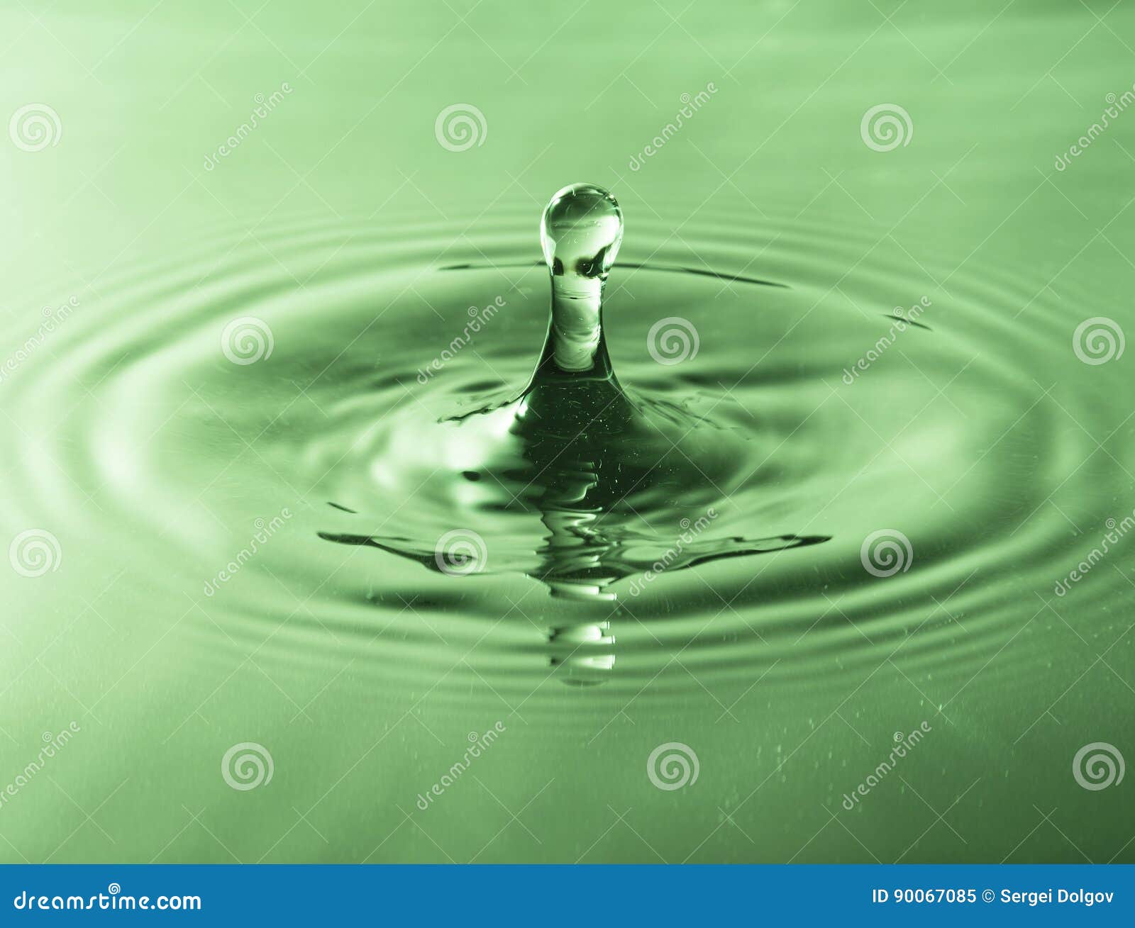 Splash of Water from Falling Drop Green Filter Stock Image - Image of ...