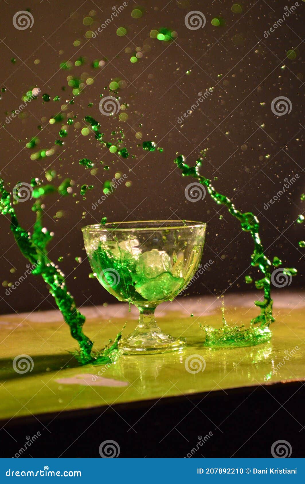 Splash Water in the Glass and Some of it Spills Around the Table Stock ...