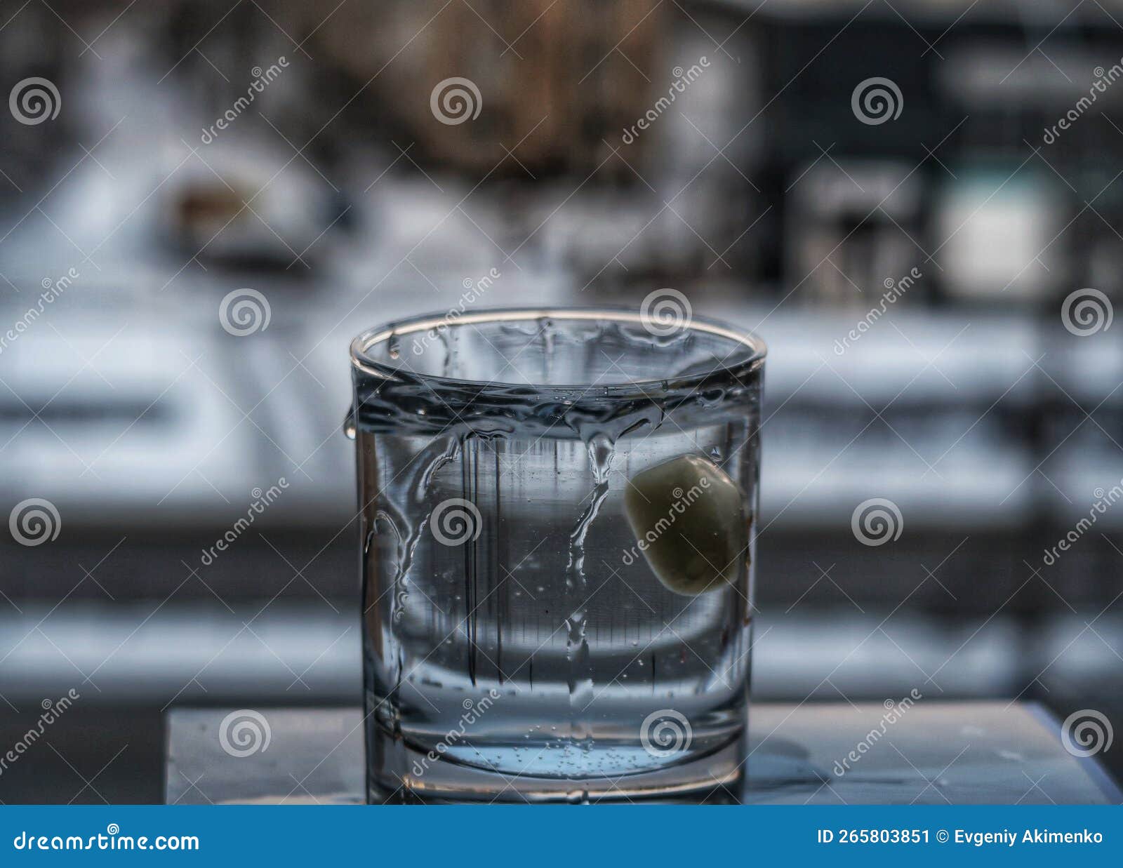 Splash of Water in a Glass from a Tossed Ice Stock Image - Image of ...