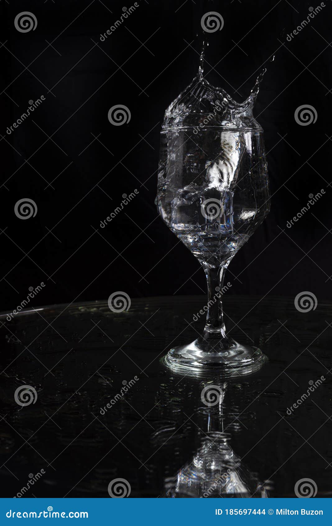A Splash with Water and Ice on a Black Background Stock Photo - Image ...