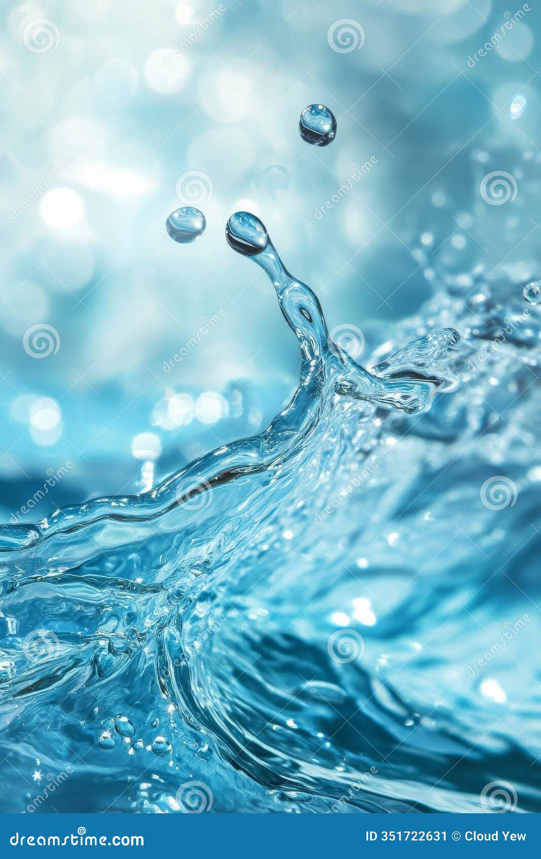 A Splash of Water with Three Drops Falling from the Top Stock ...