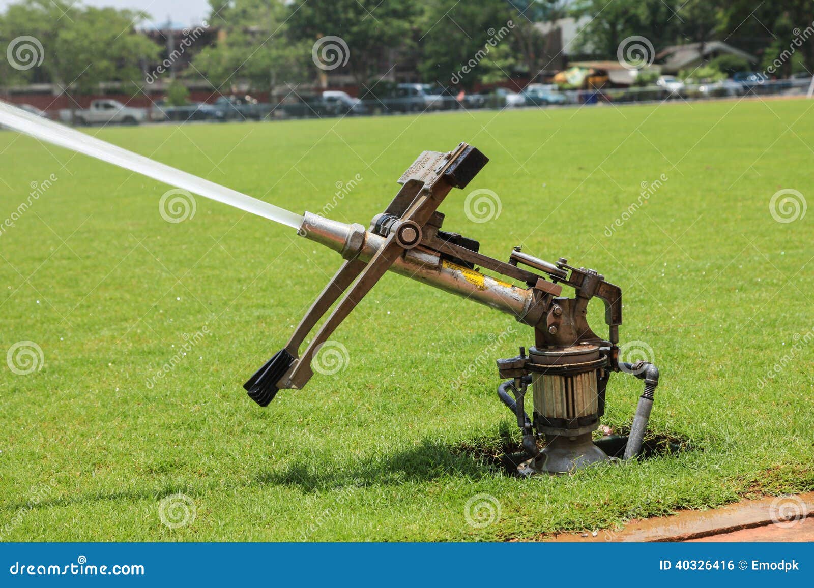 Splash Water To Football Field Stock Photo - Image of springer, grass ...
