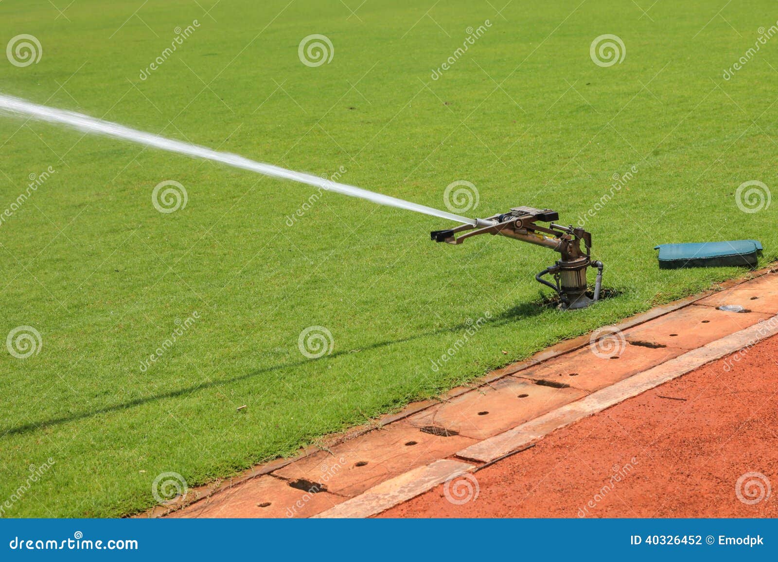 Splash Water To Football Field Stock Photo - Image of splash, sport ...