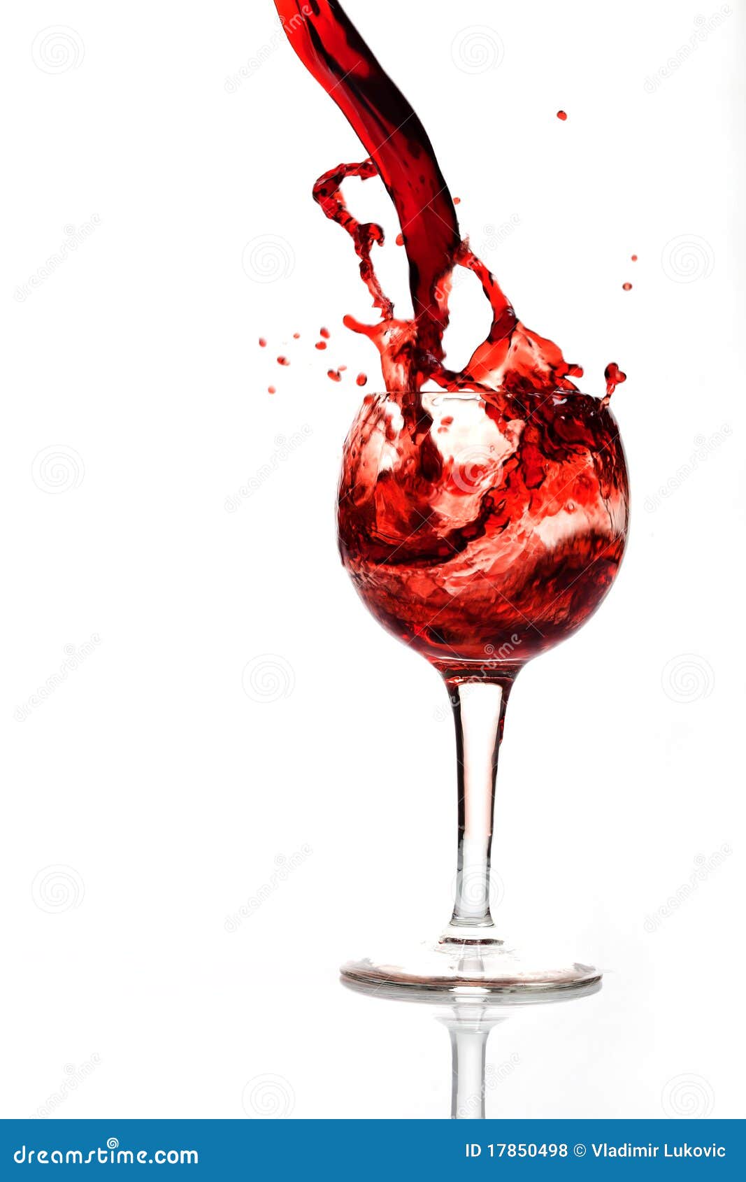 A splash of wine in glass stock photo. Image of beverage - 17850498