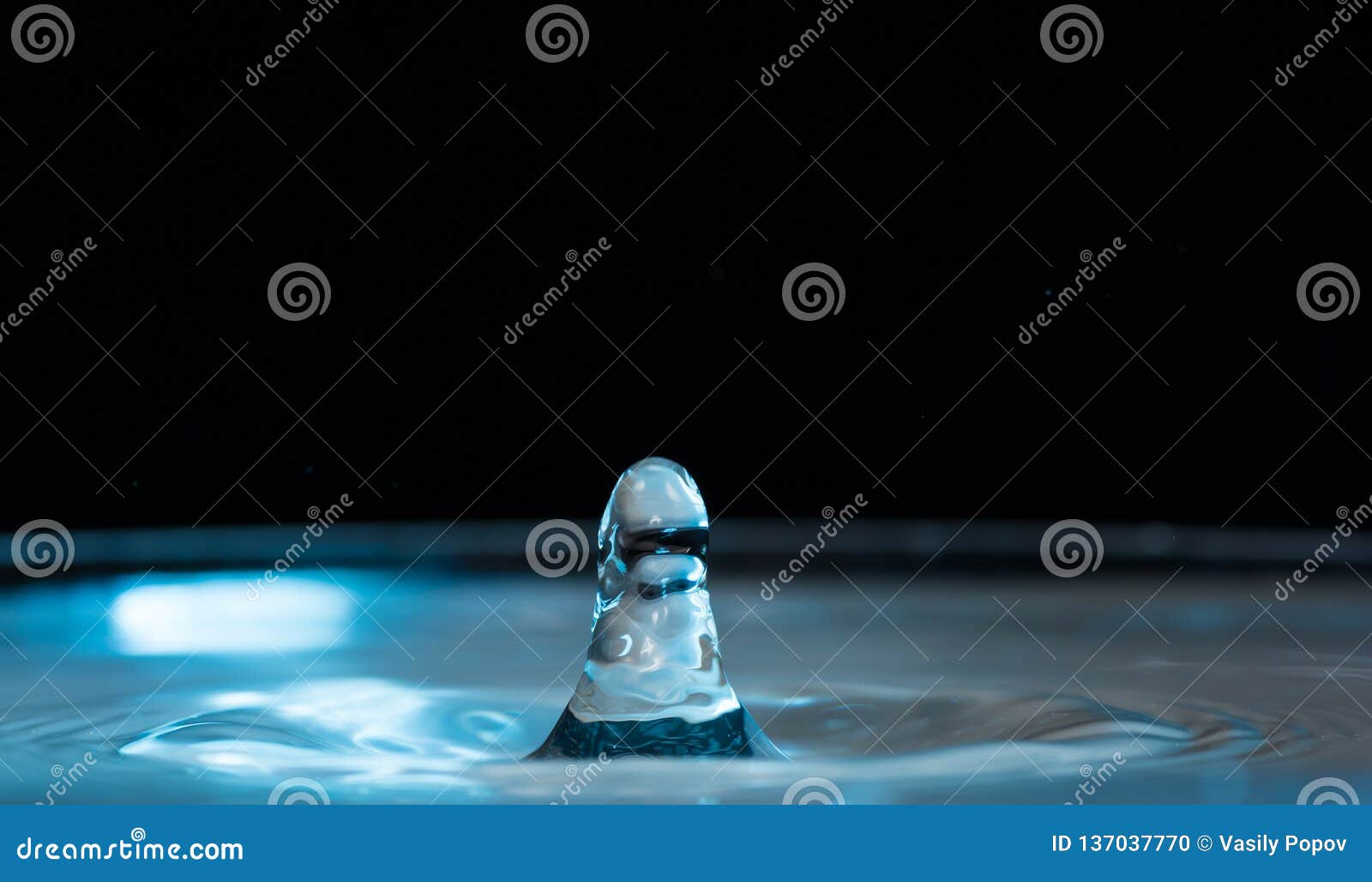 Splashed Out and Splashed from a Falling Drop on a Colored or Black ...