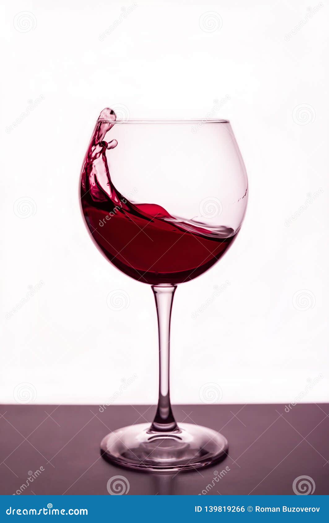 Splashes of Red Wine in a Wineglass Stock Photo - Image of domestic ...