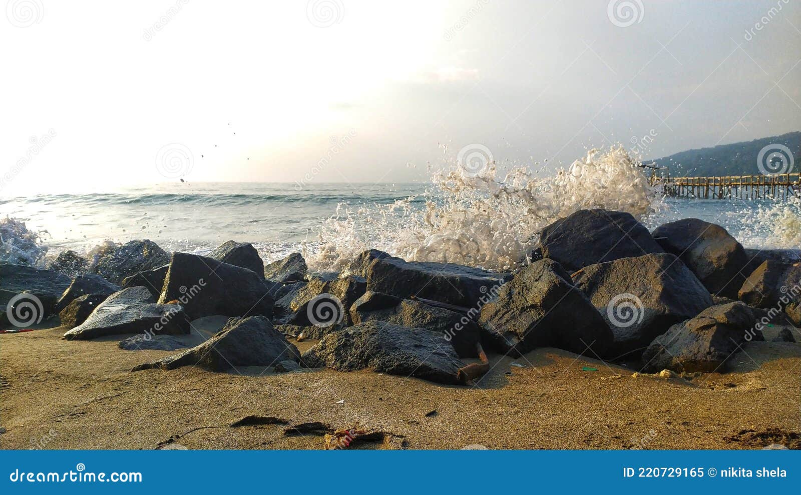 Splashes of Sea Water on the Beach because it Hits the Rocks Stock ...