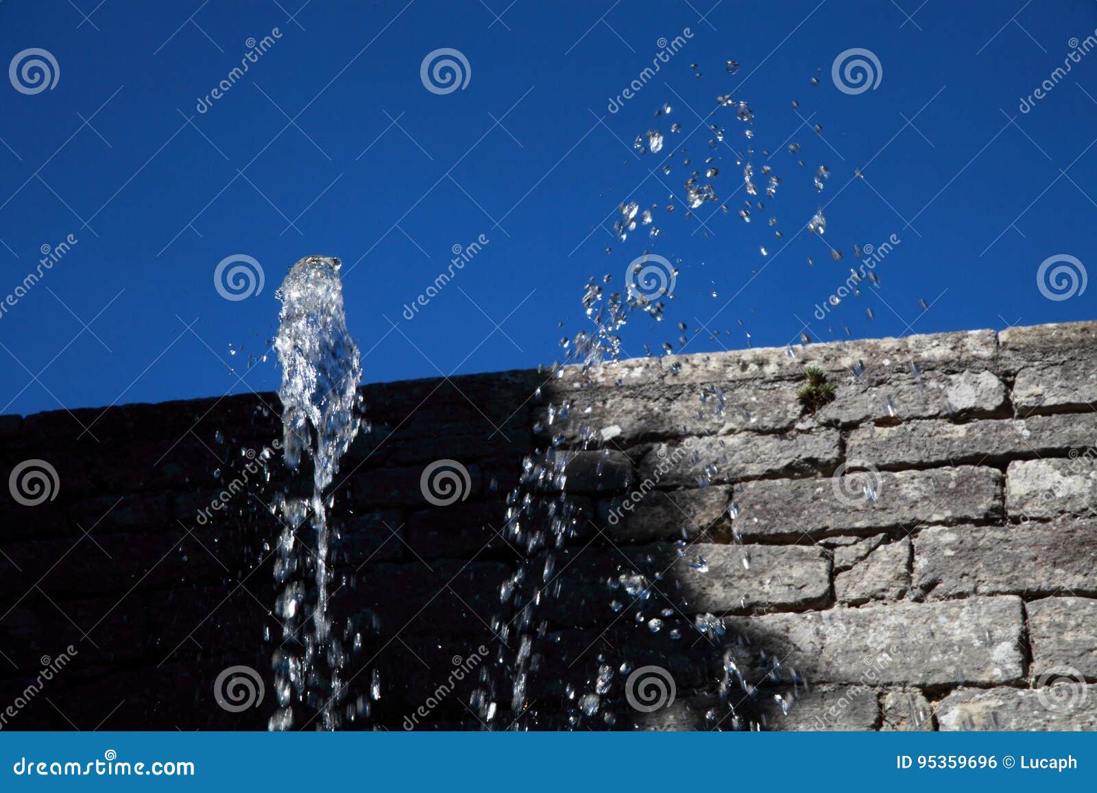 Splashes of Water on Brick Wall Background a Stock Photo - Image of ...