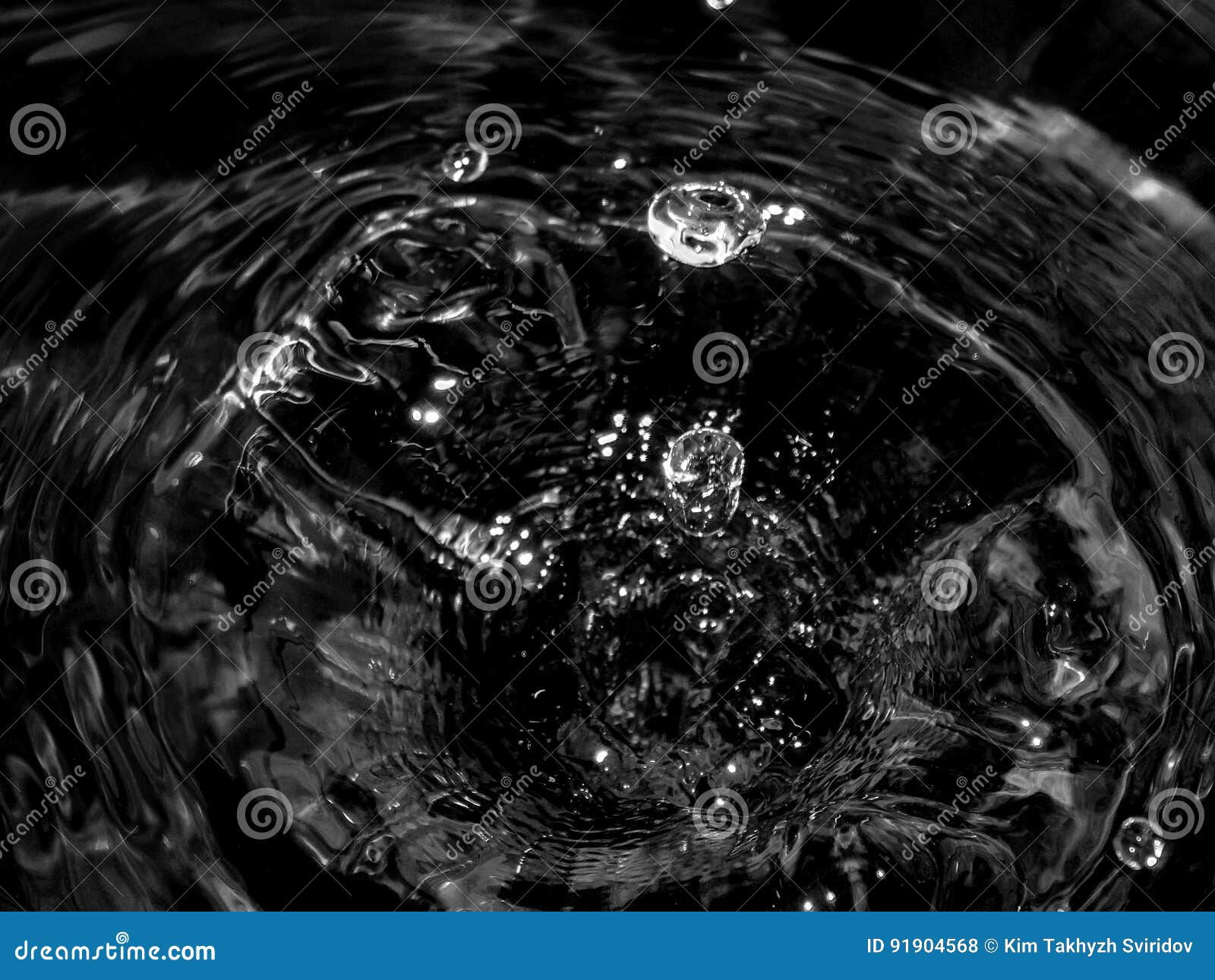 Splashes of Water with a Splash on a Black and White Image Stock Photo ...