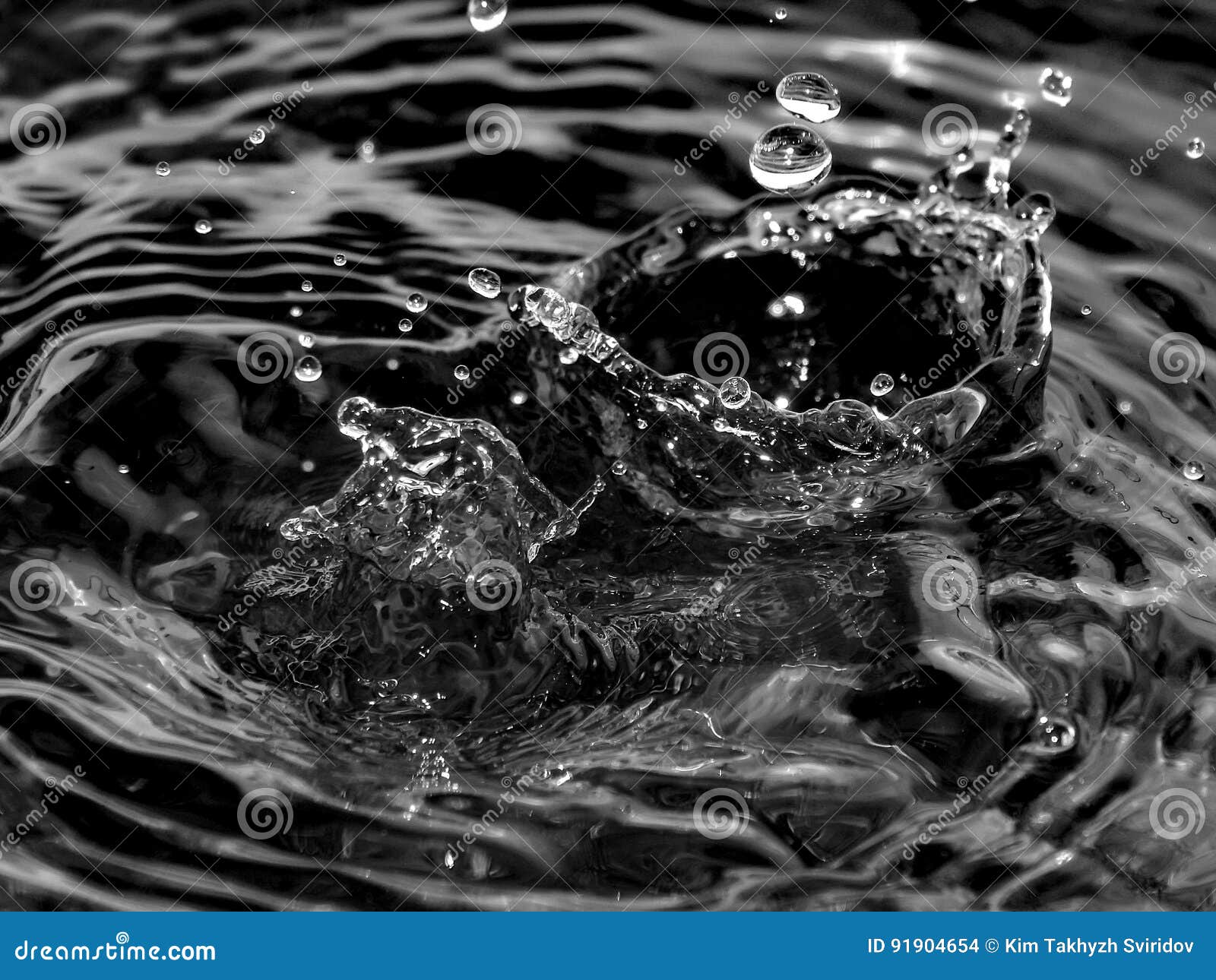 Splashes of Water with a Splash on a Black and White Image Stock Photo ...