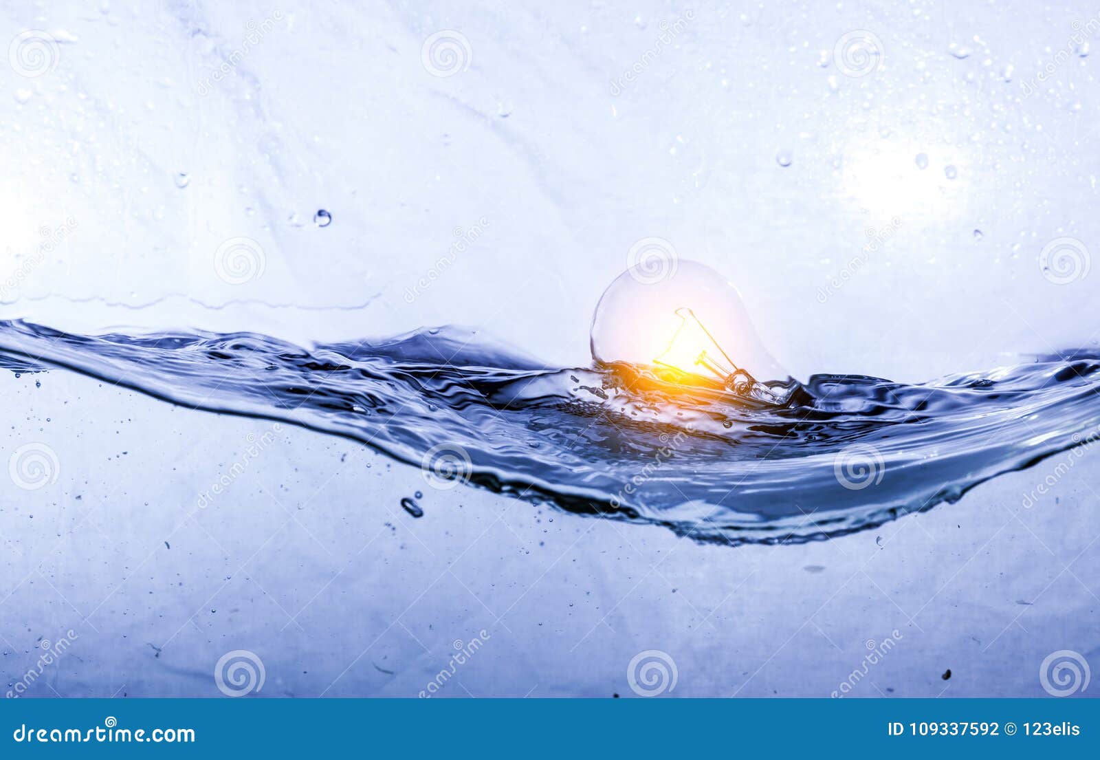 Splashing Light Bulb stock photo. Image of electricity - 109337592