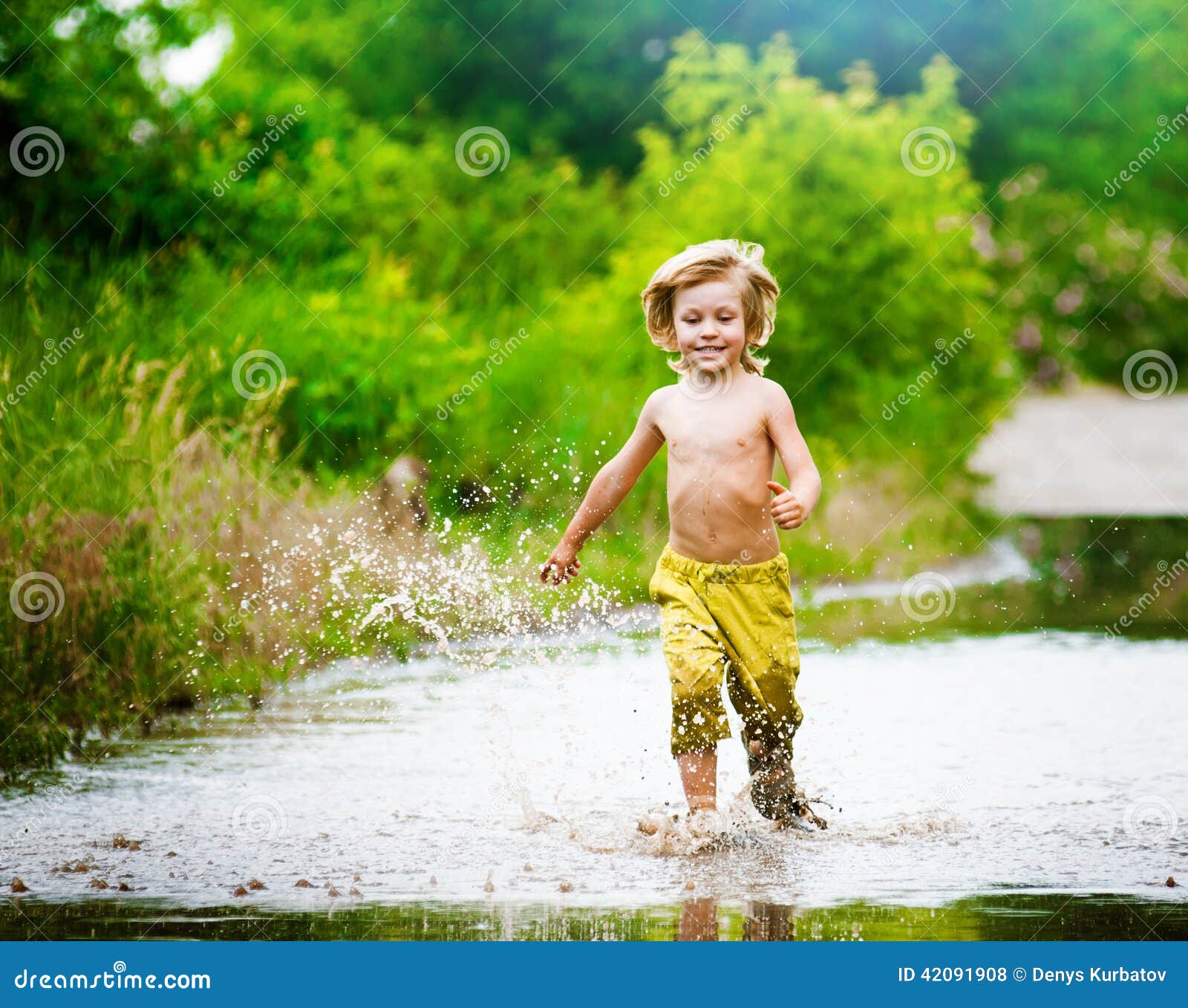 Splashing in a puddle stock photo. Image of childhood - 42091908