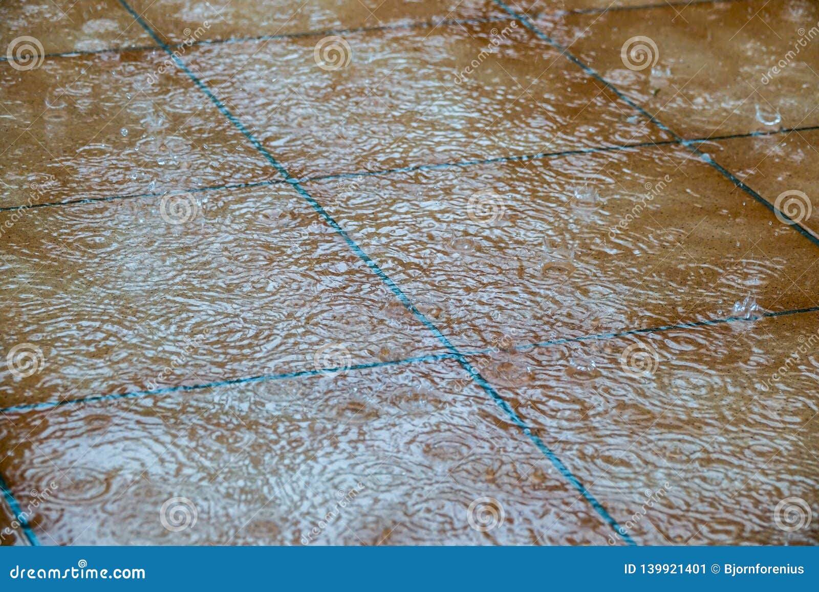 Splashing Rain Drops on Patio Tile Floor Stock Image - Image of surface ...
