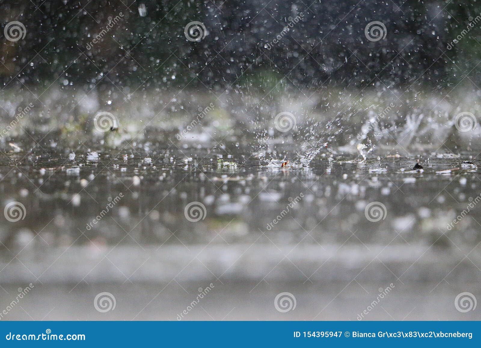 Close Up of Falling and Splashing Rain on the Street Stock Image ...